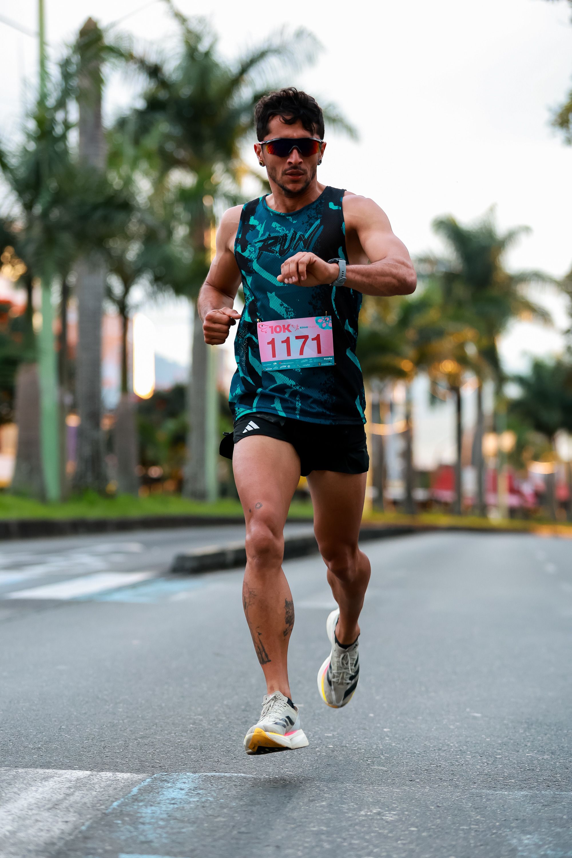 Male Athlete Running in Outdoor Marathon Event · Free Stock Photo
