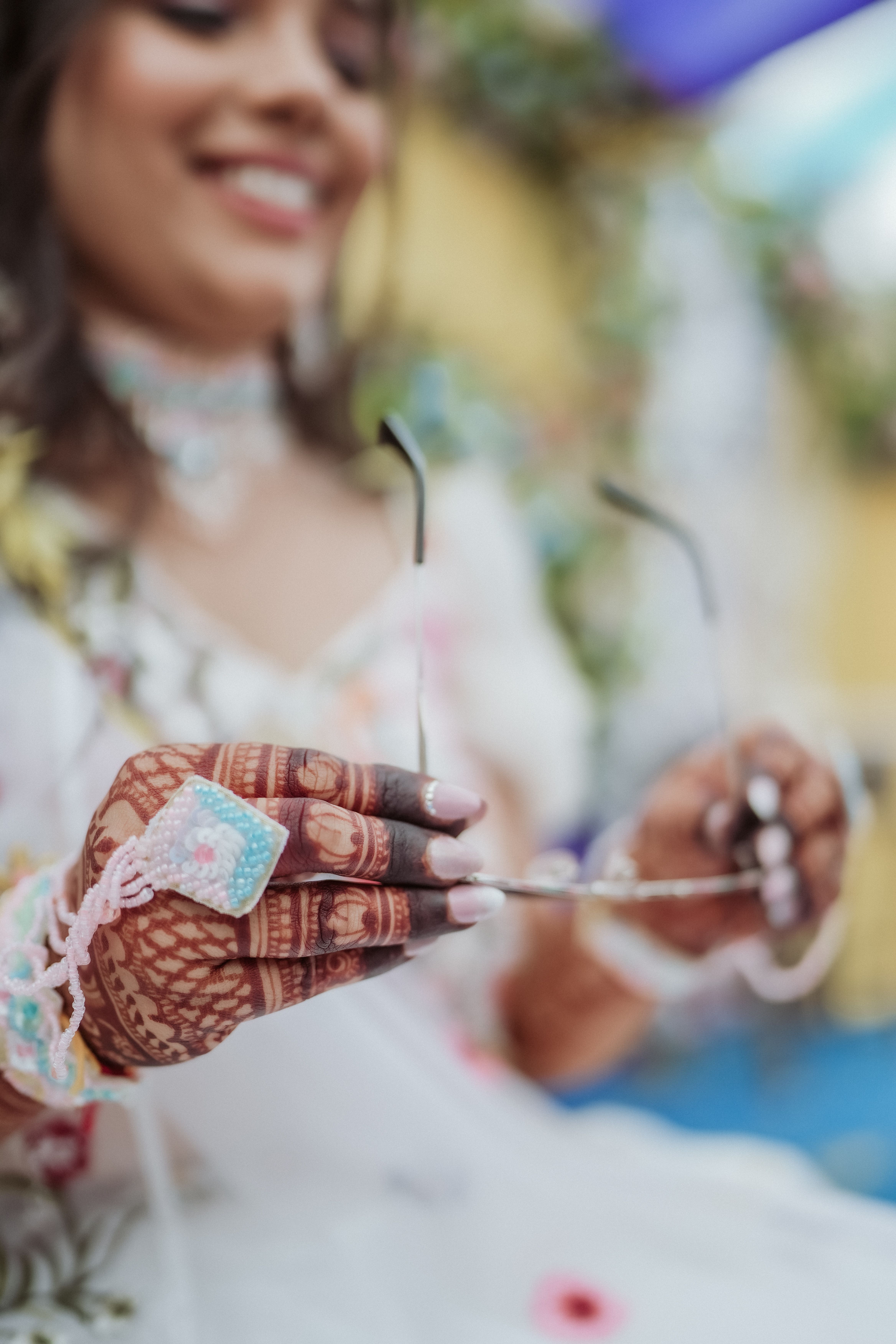 Bride with Henna Holding Sunglasses · Free Stock Photo
