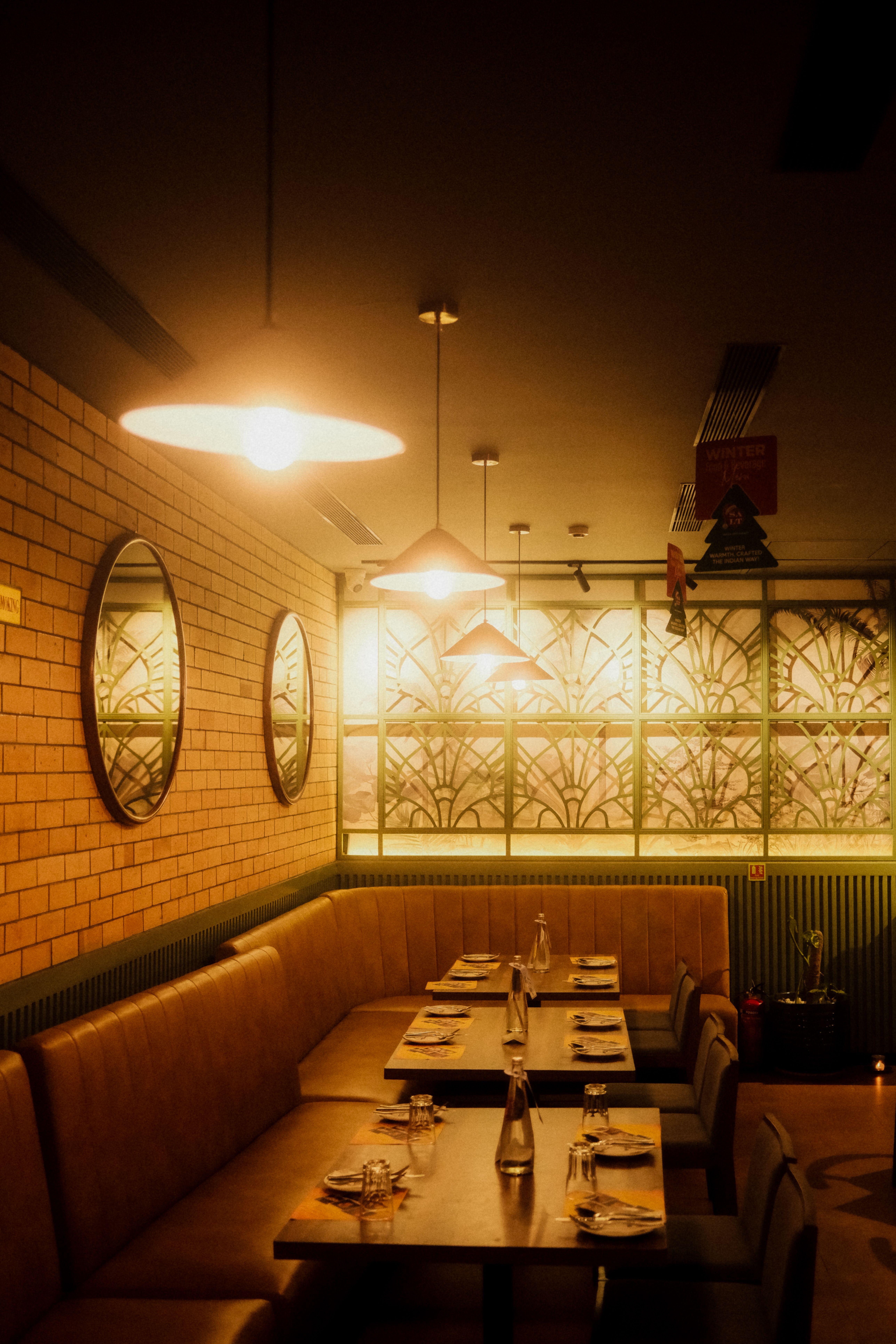 Warm and Cozy Restaurant Interior with Ambient Lighting · Free Stock Photo