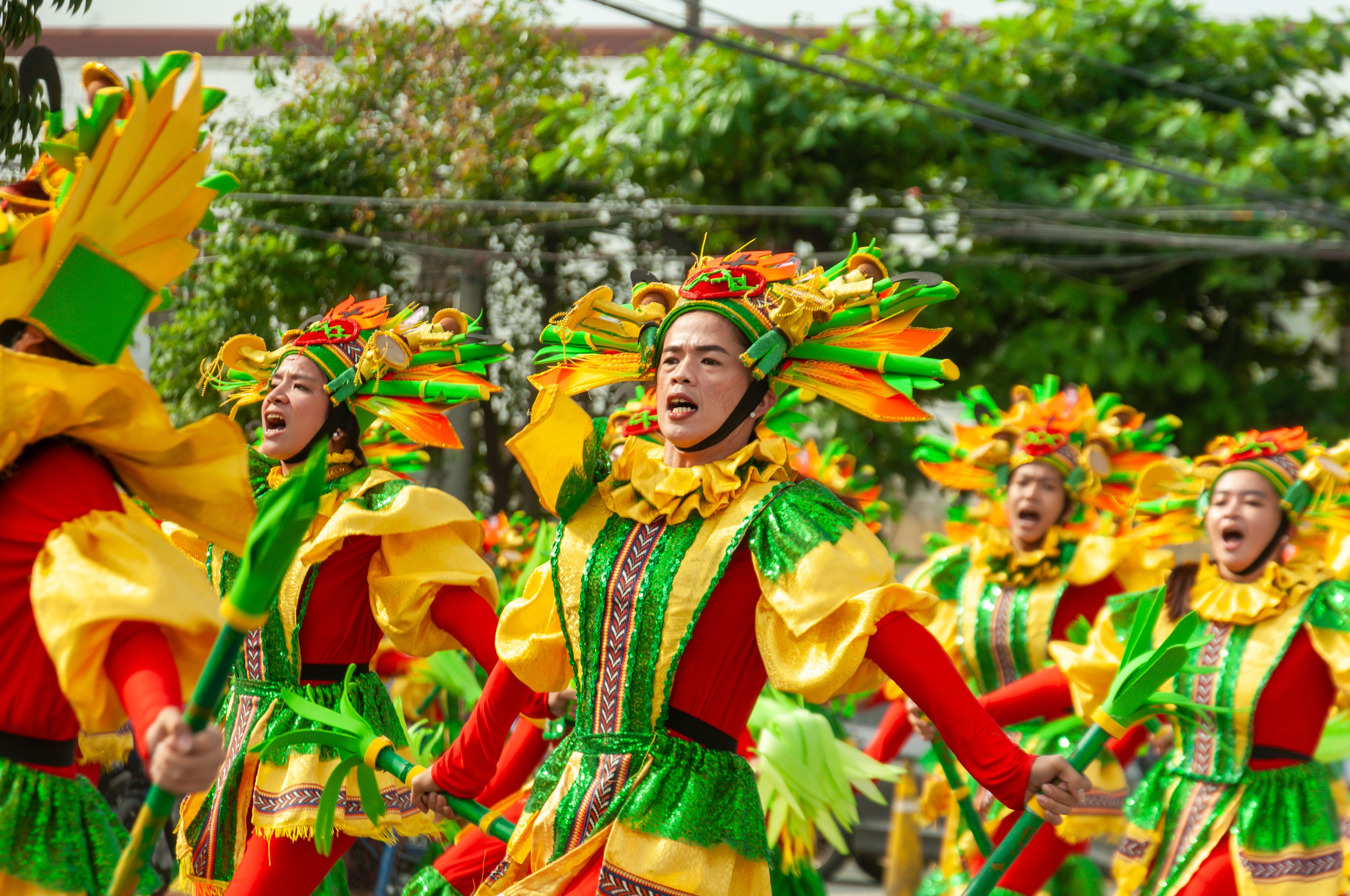 Vibrant Festival Parade with Colorful Costumes · Free Stock Photo