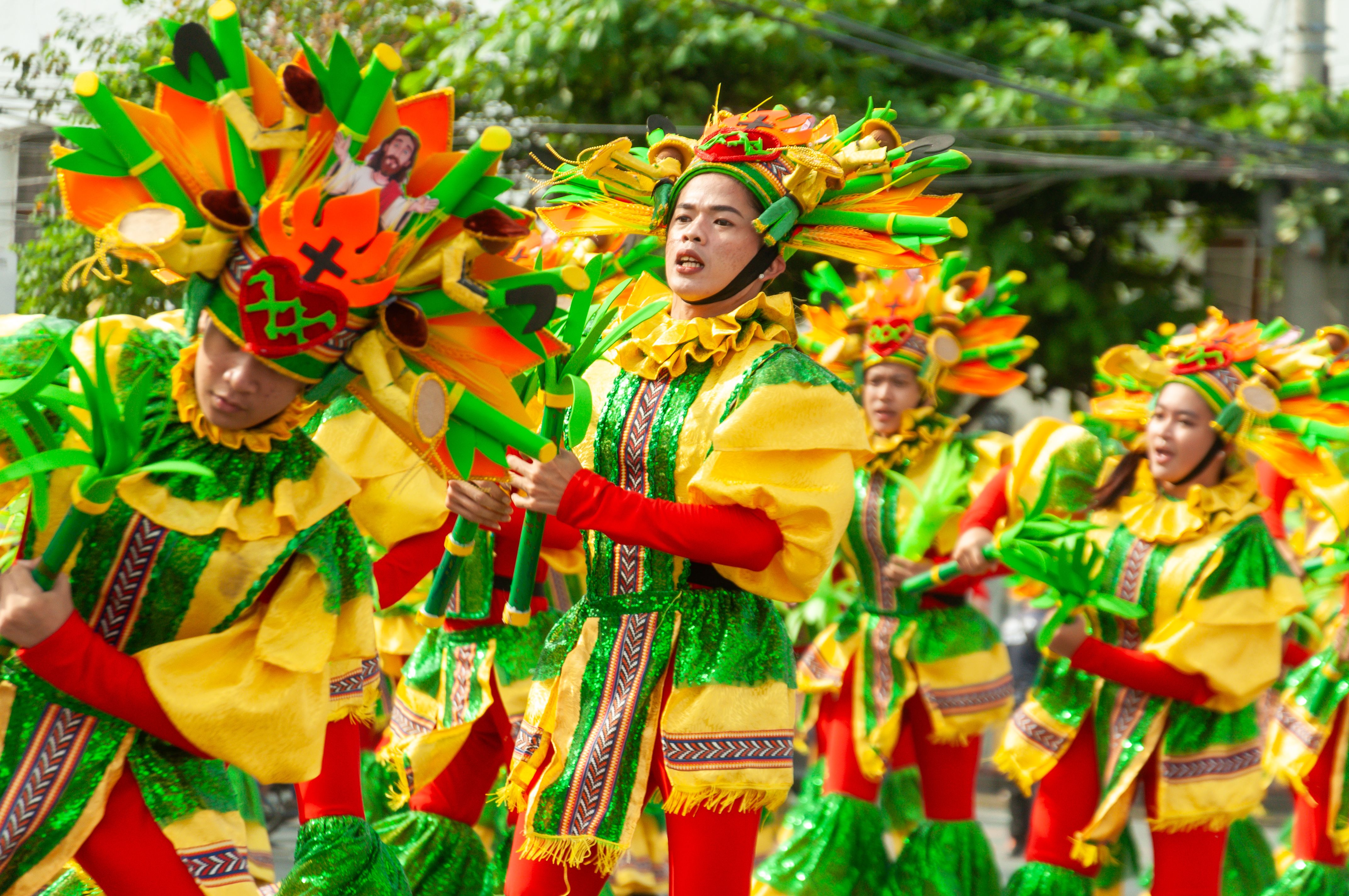 Vibrant Festival Parade with Colorful Costumes · Free Stock Photo