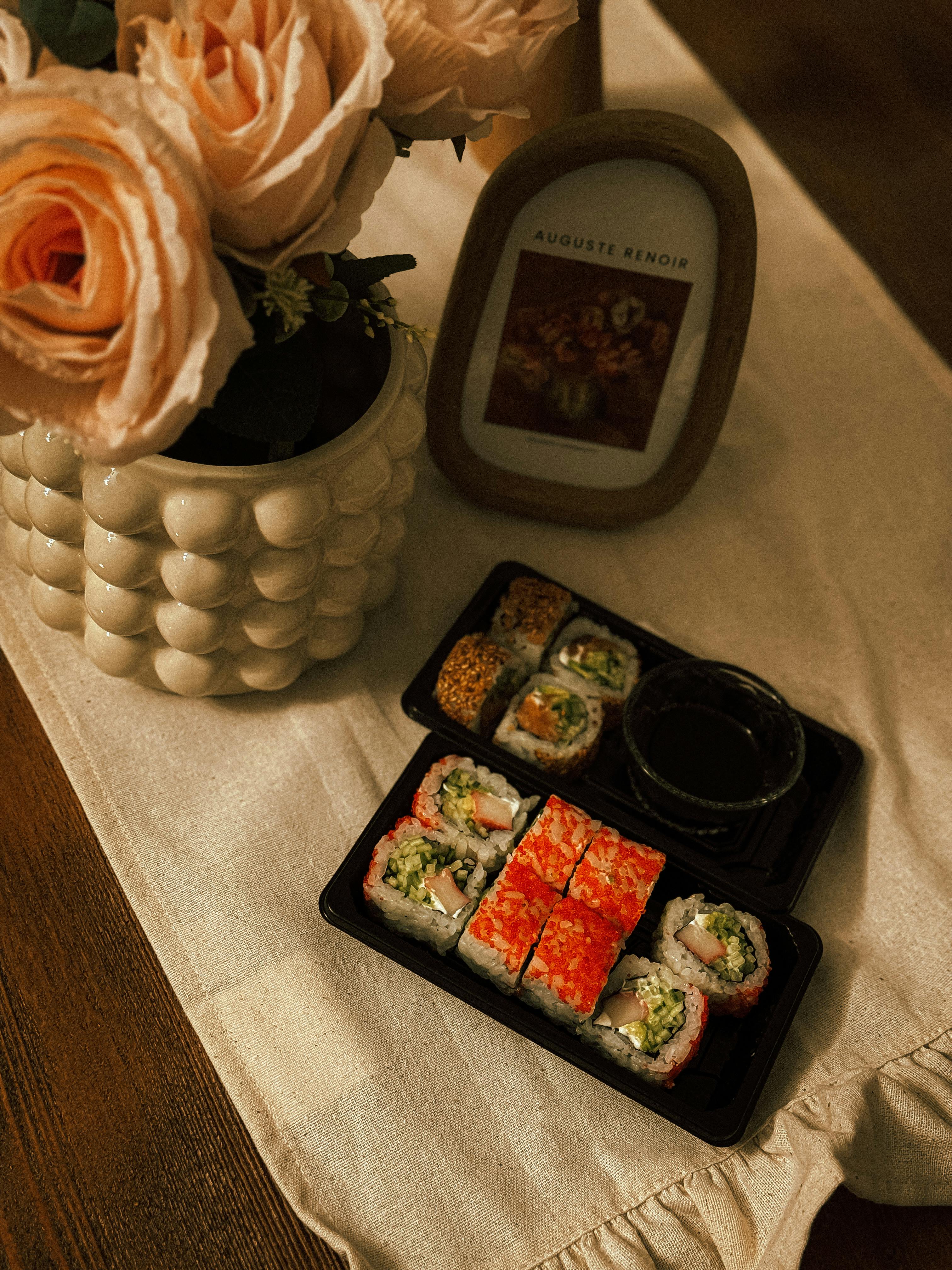 Elegant Table Setting with Sushi and Roses · Free Stock Photo