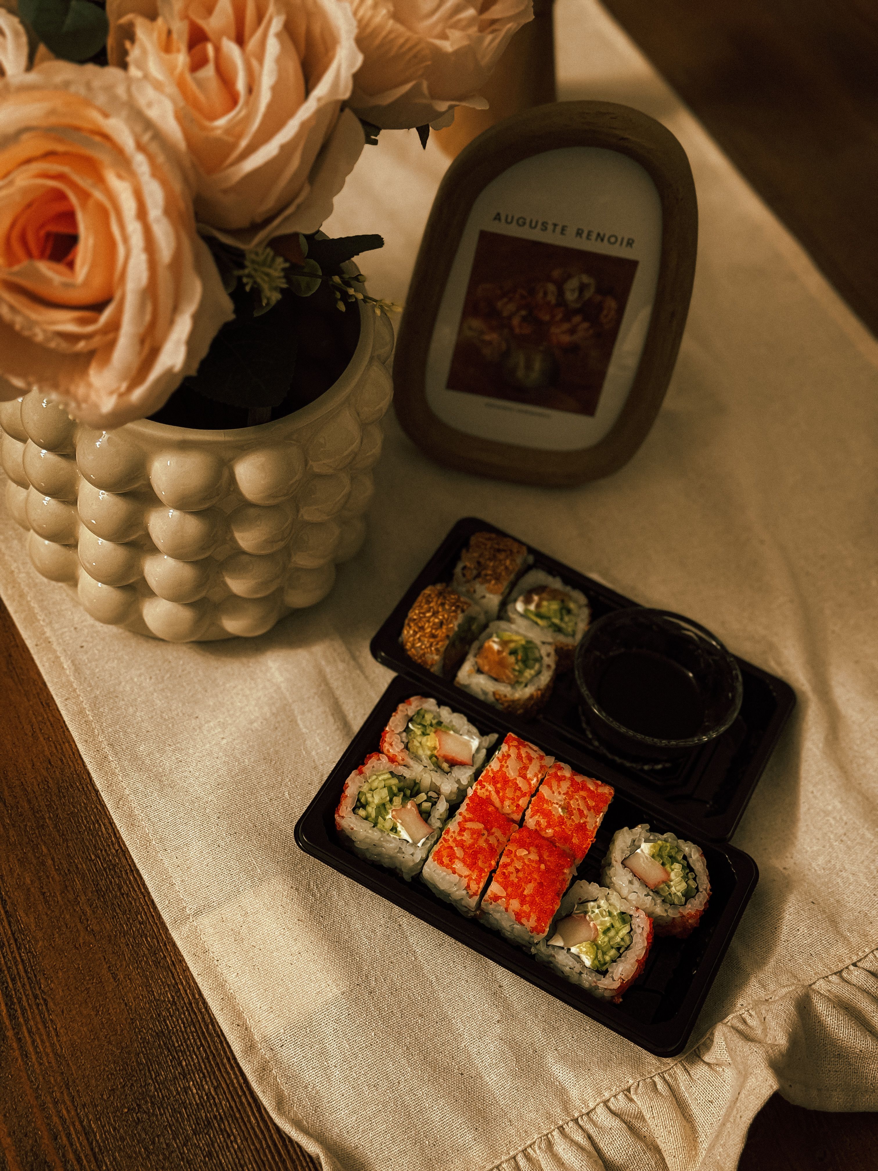 Elegant Table Setting with Sushi and Roses · Free Stock Photo
