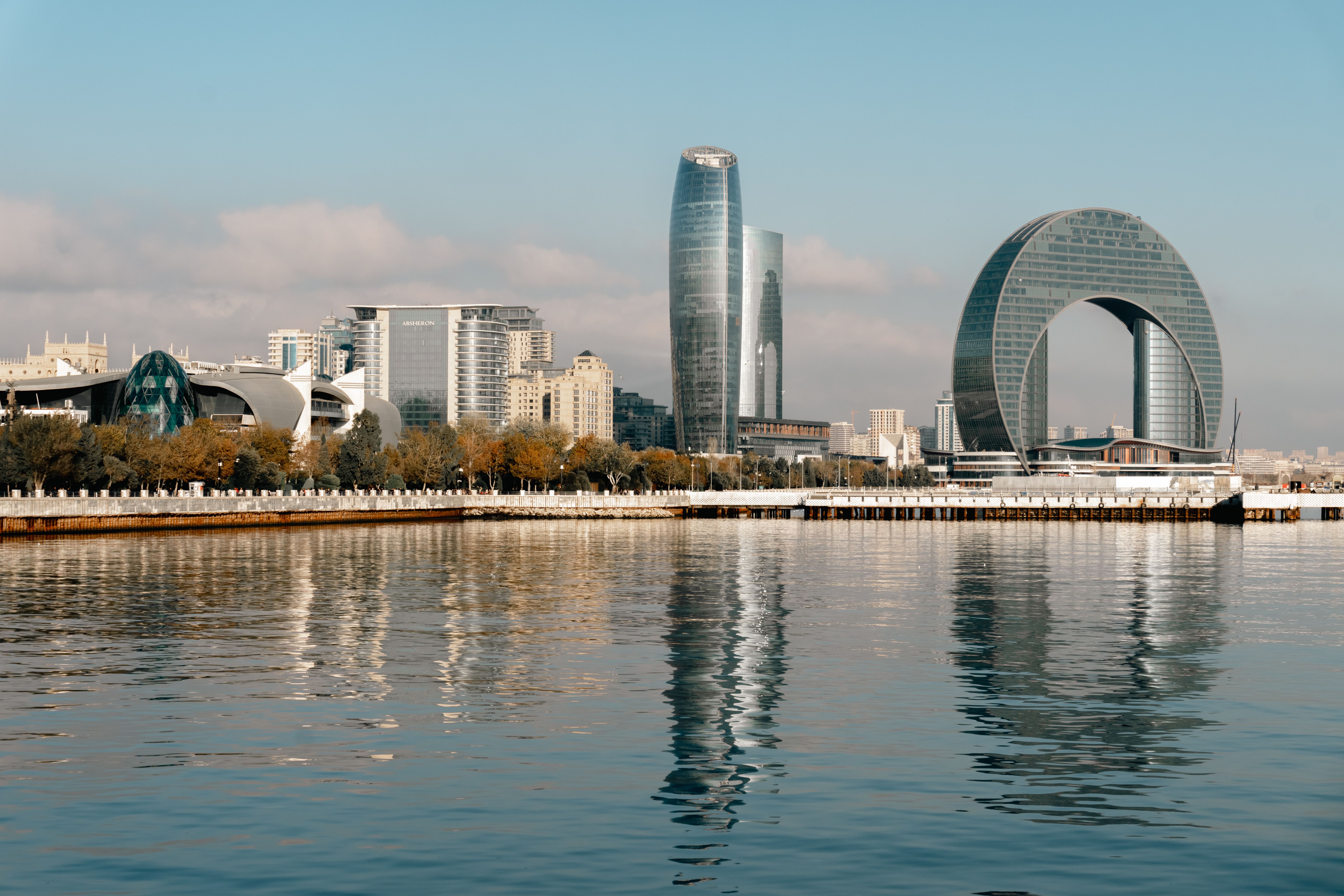 Baku Cityscape with Iconic Crescent Moon Building · Free Stock Photo