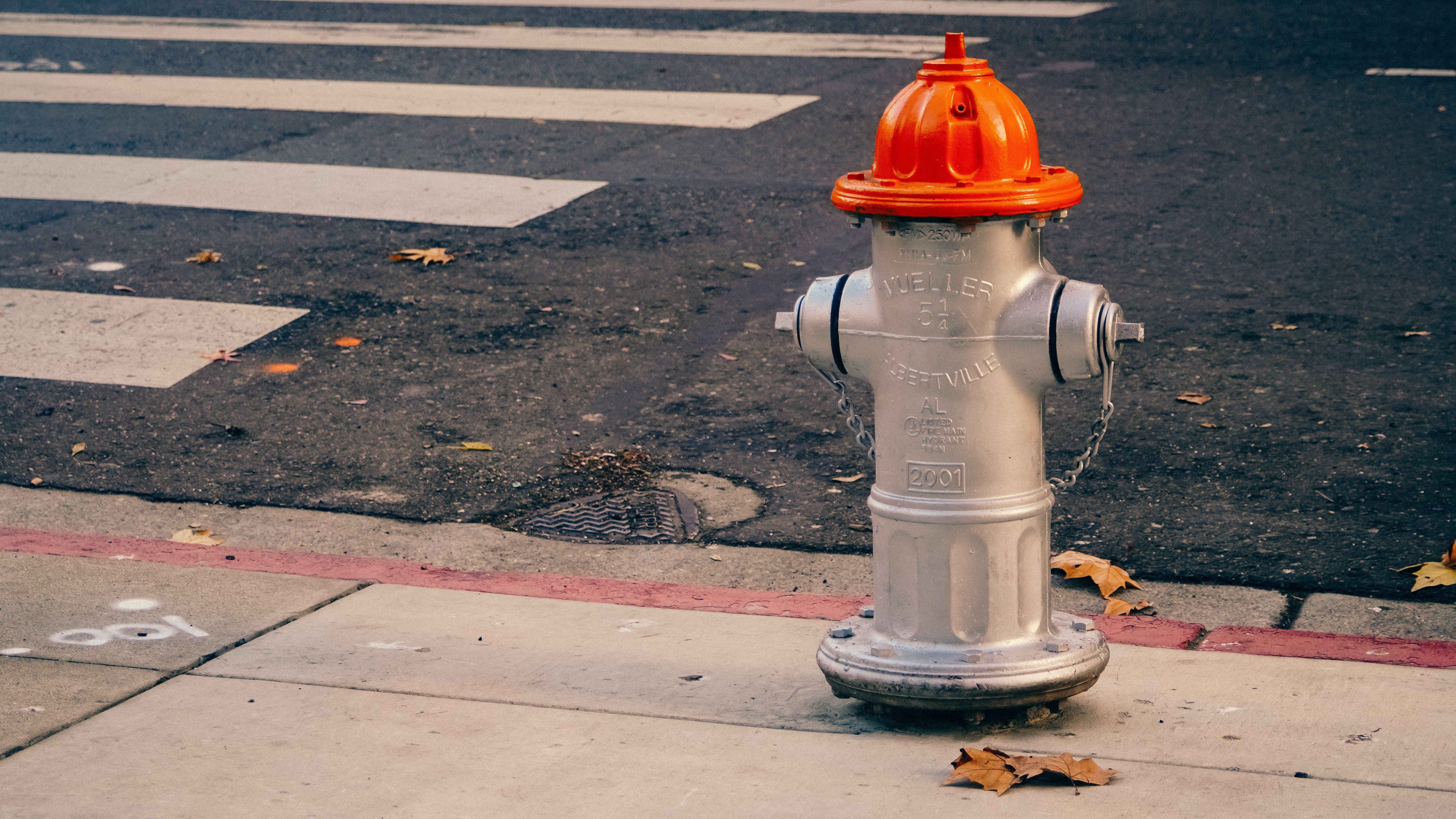 Orange Fire Hydrant on Urban Street Corner · Free Stock Photo