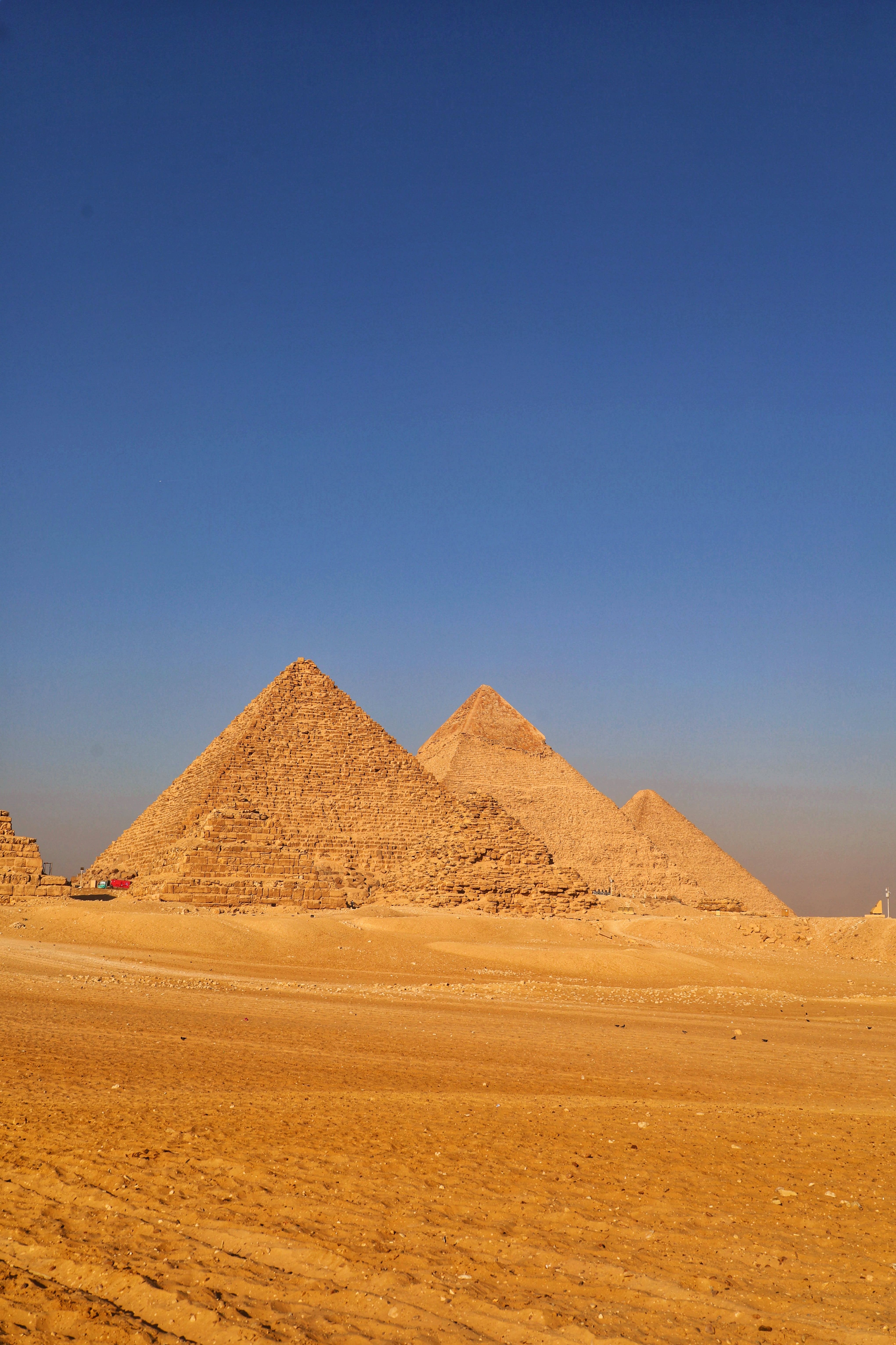 Majestic Pyramids of Giza under Clear Blue Sky · Free Stock Photo