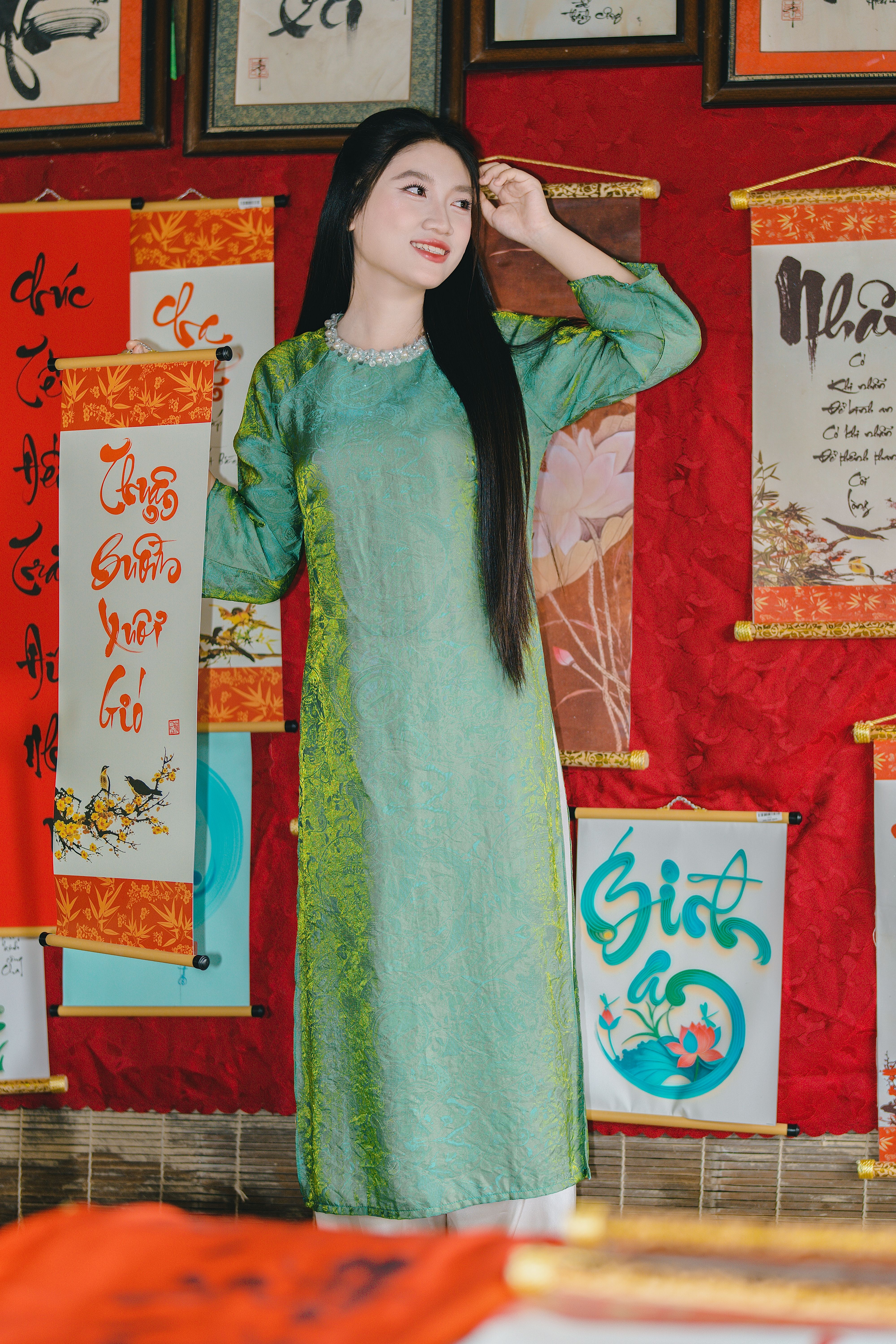 Woman in Traditional Vietnamese Dress with Calligraphy · Free Stock Photo