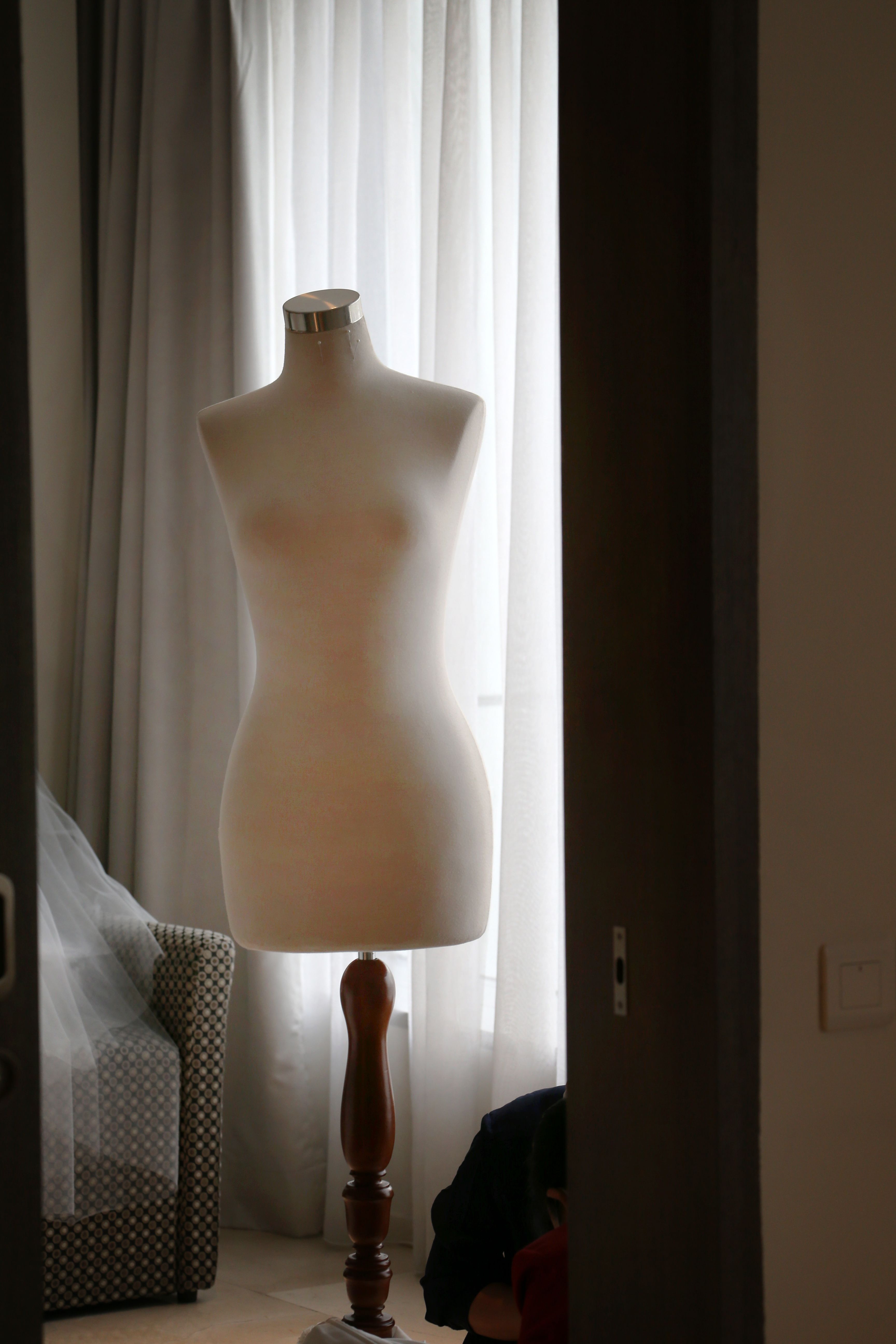 Fashion Mannequin in Softly Lit Room Interior · Free Stock Photo