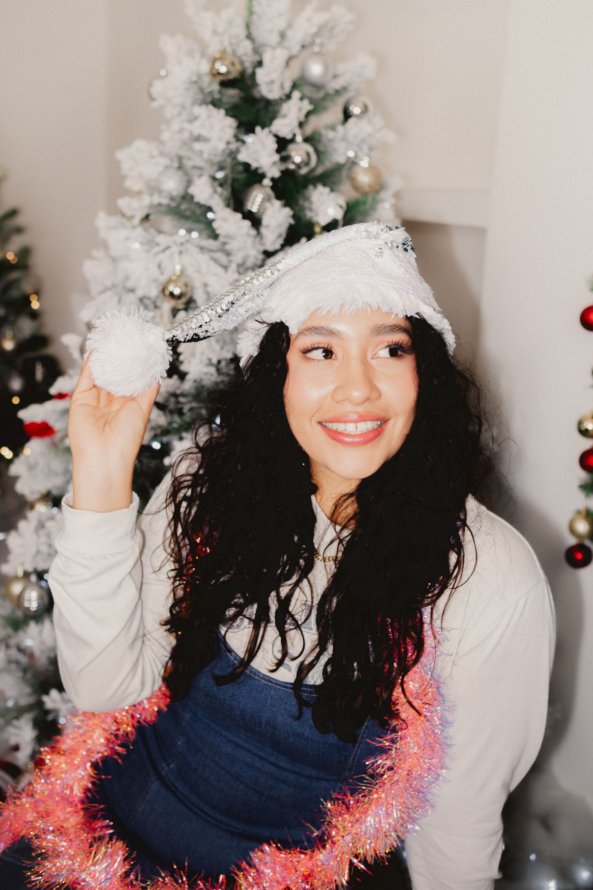 Joyful Holiday Portrait with Christmas Decorations · Free Stock Photo