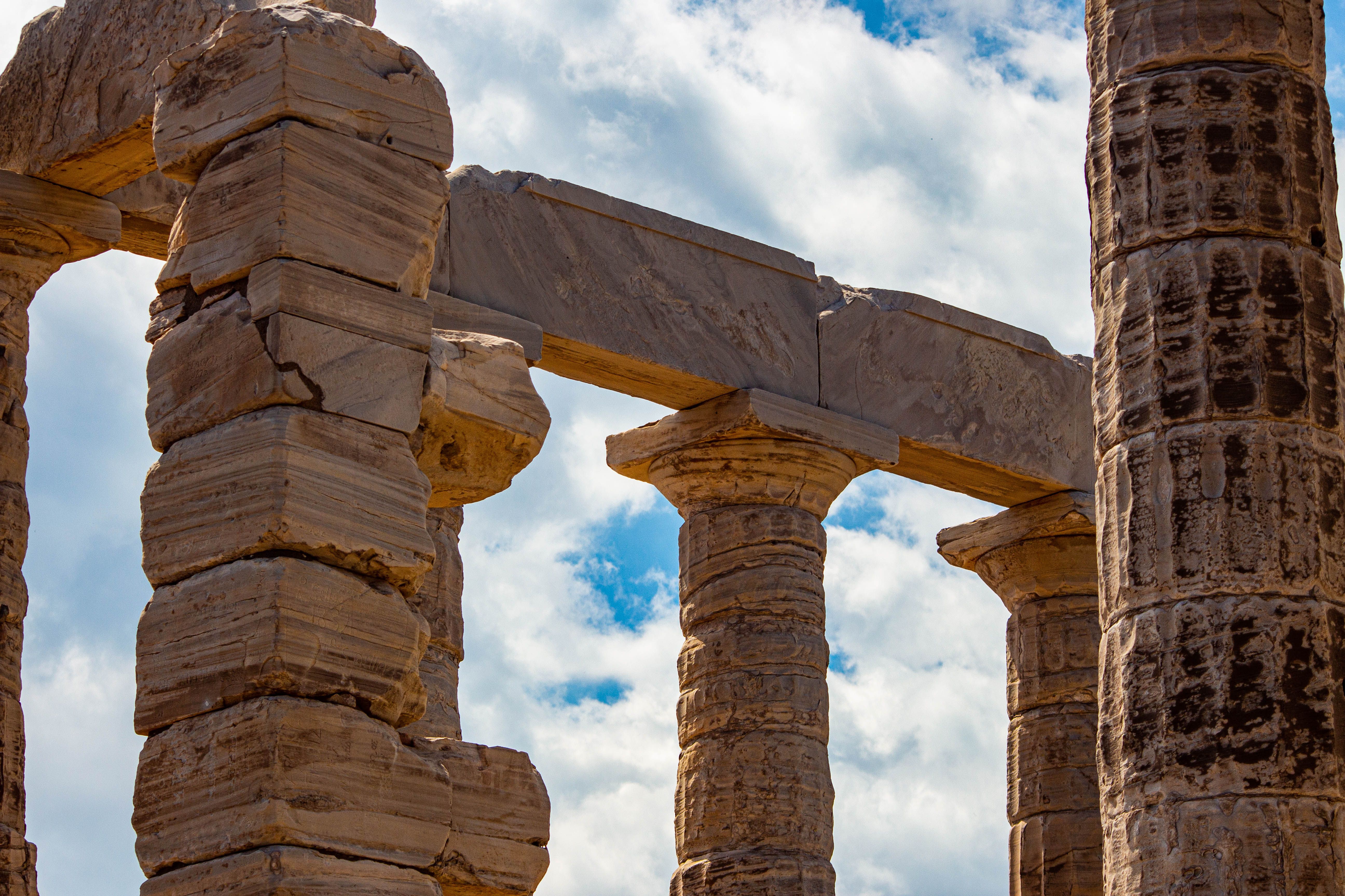 Ancient Greek Temple Ruins Against Blue Sky · Free Stock Photo