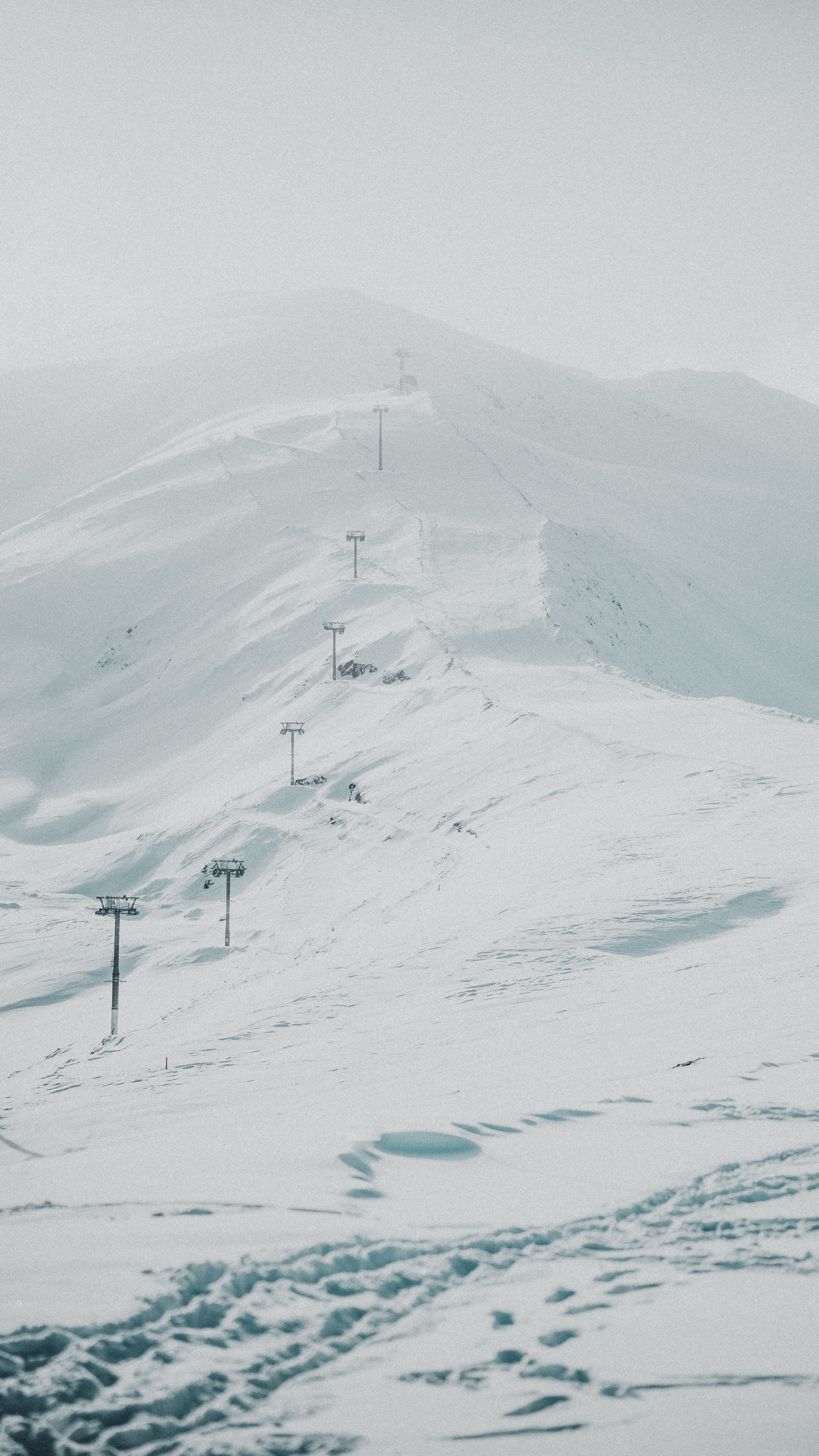 Snow-covered mountain ski lift landscape · Free Stock Photo