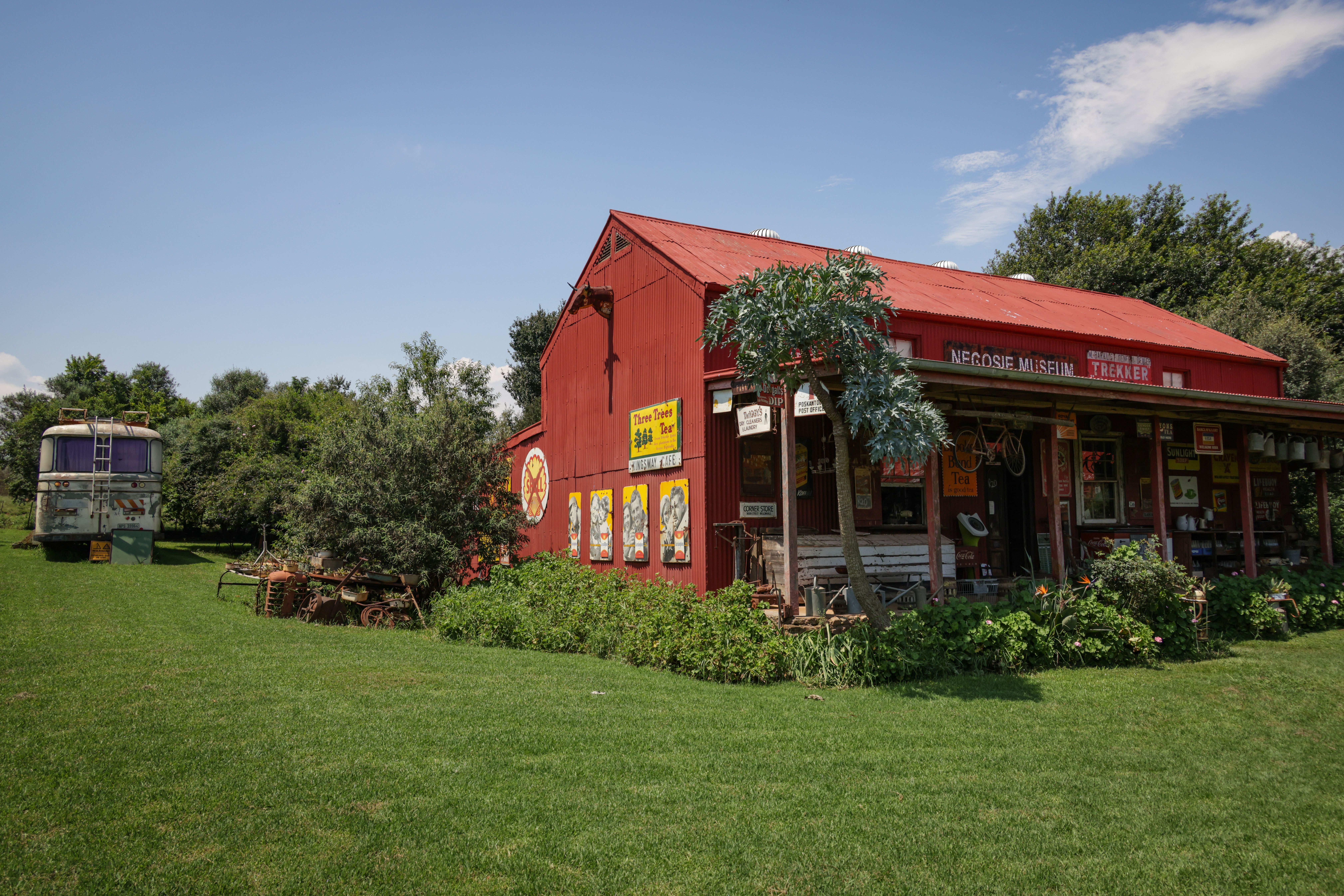 Vintage Farmhouse with Red Roof and Rustic Decor · Free Stock Photo