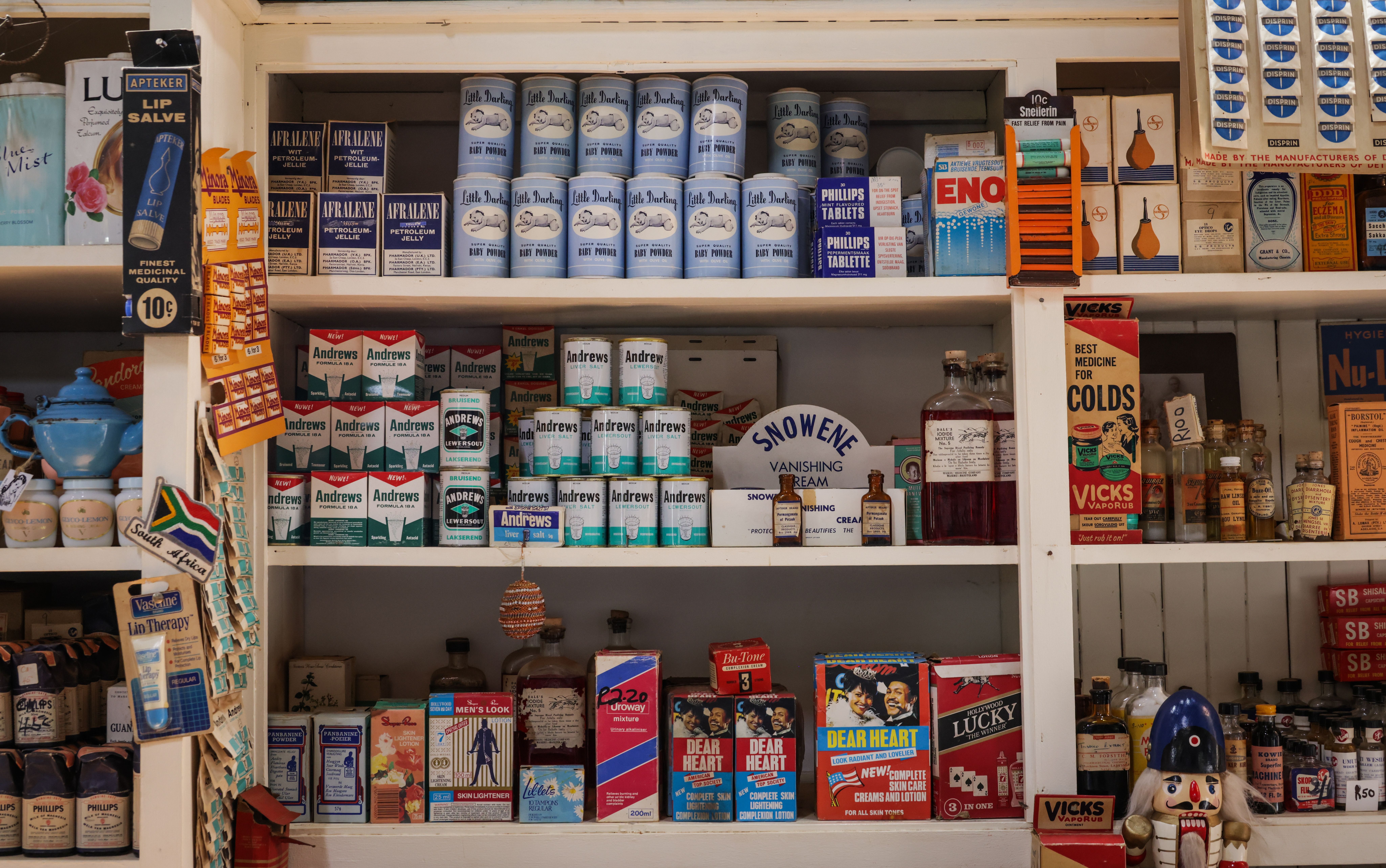 Vintage Shop Shelf with Retro Packaging · Free Stock Photo