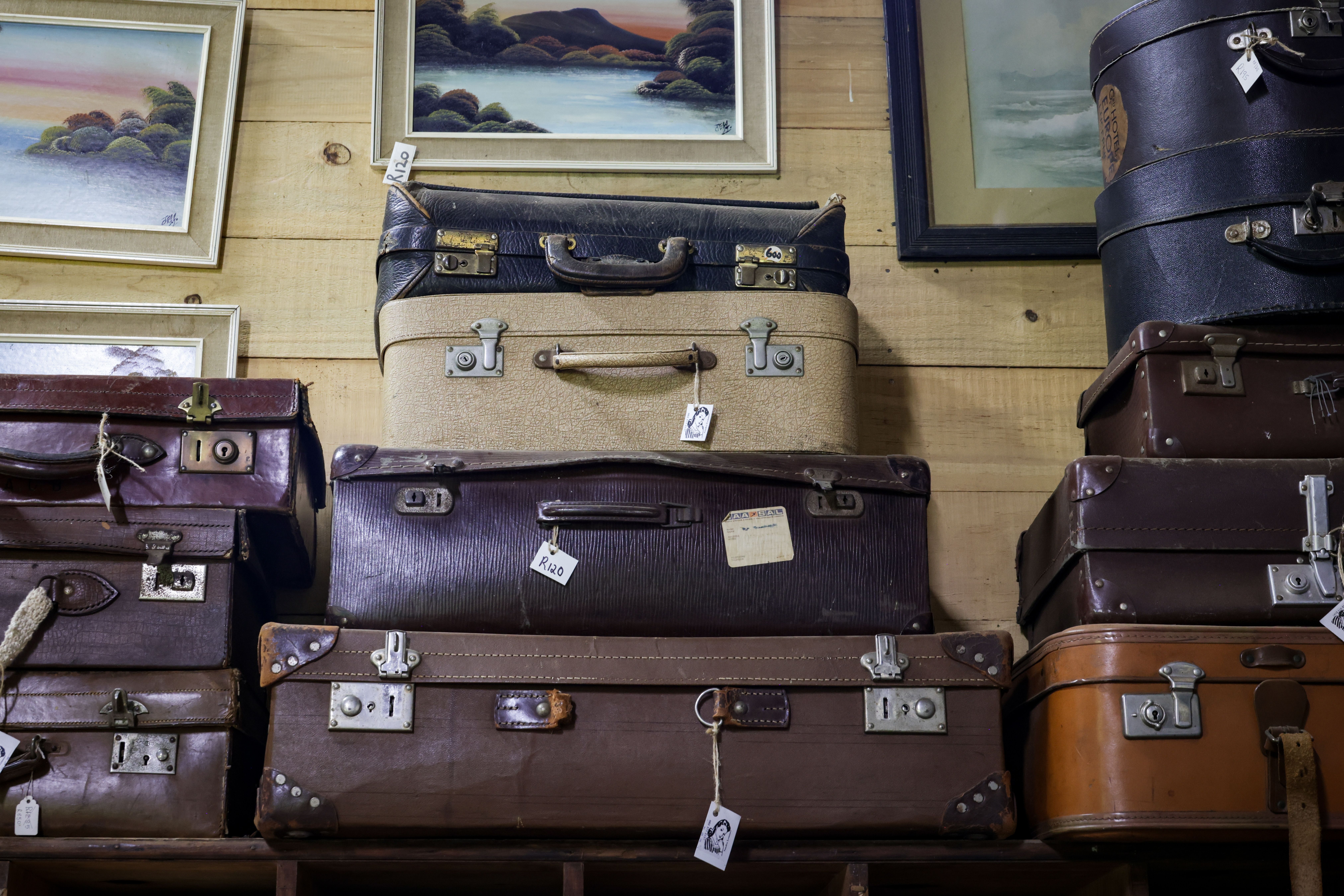 Stack of Vintage Suitcases in Antique Store · Free Stock Photo
