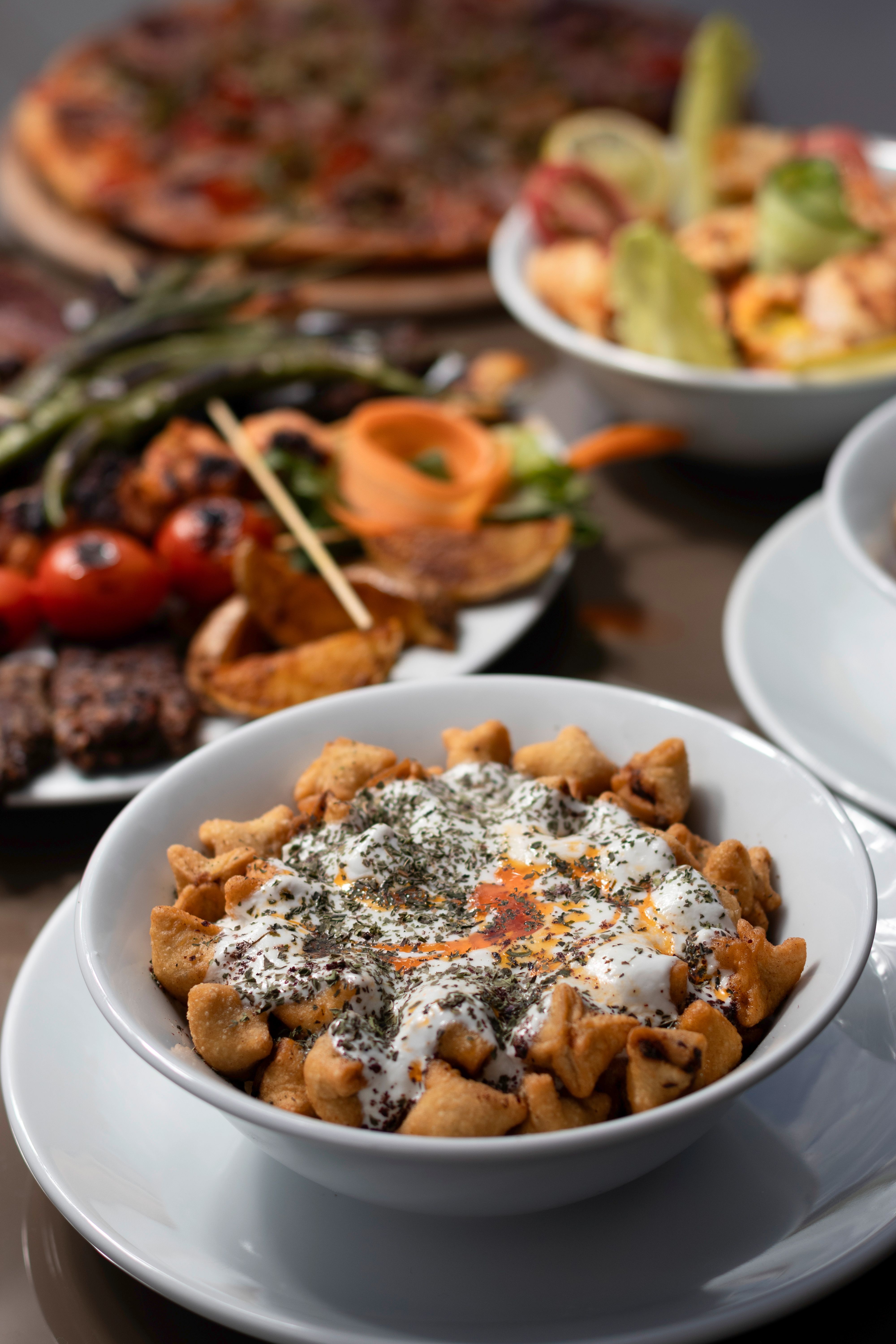 Delicious Mediterranean Meal with Mixed Dishes · Free Stock Photo