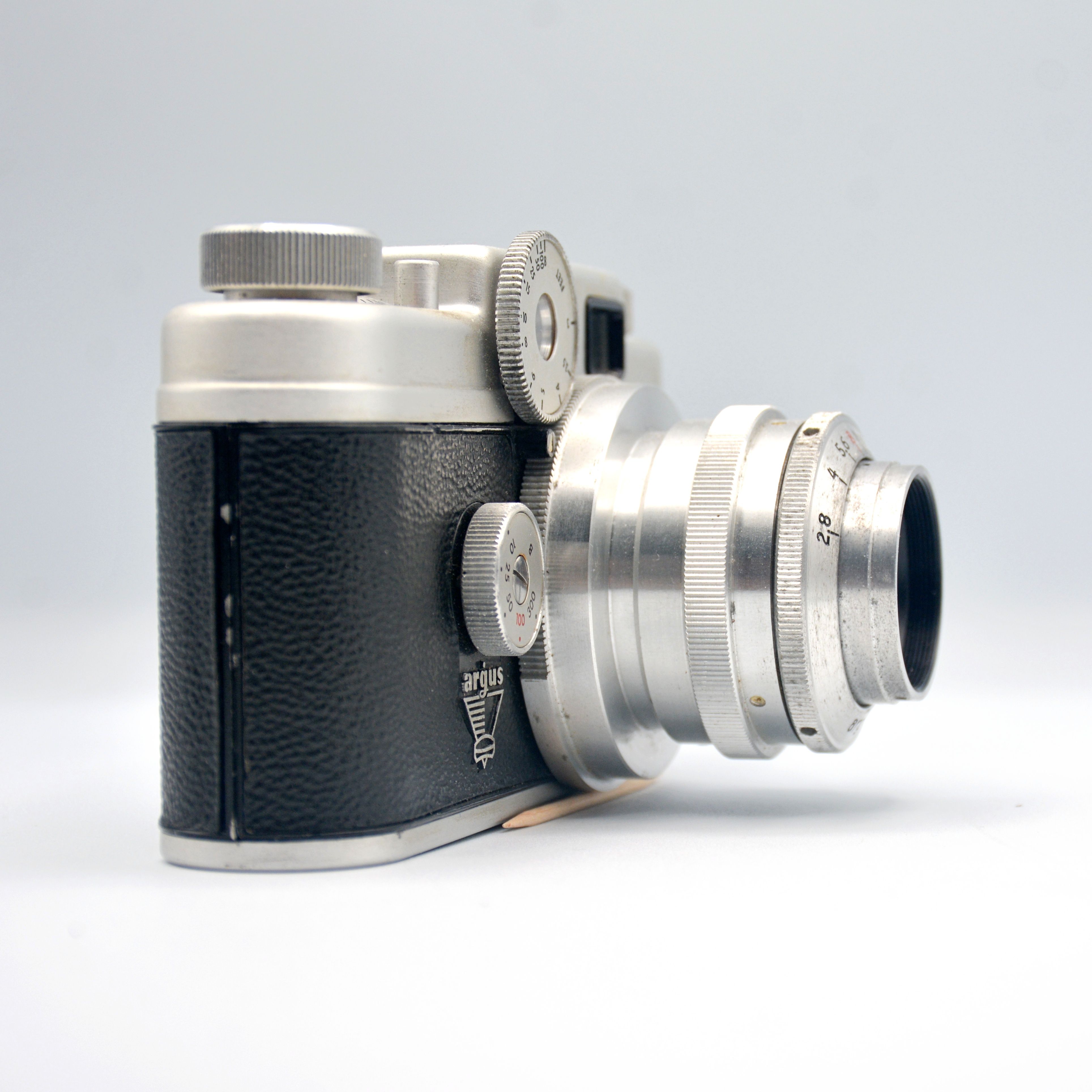 Vintage Argus Camera with Lens on White Background · Free Stock Photo