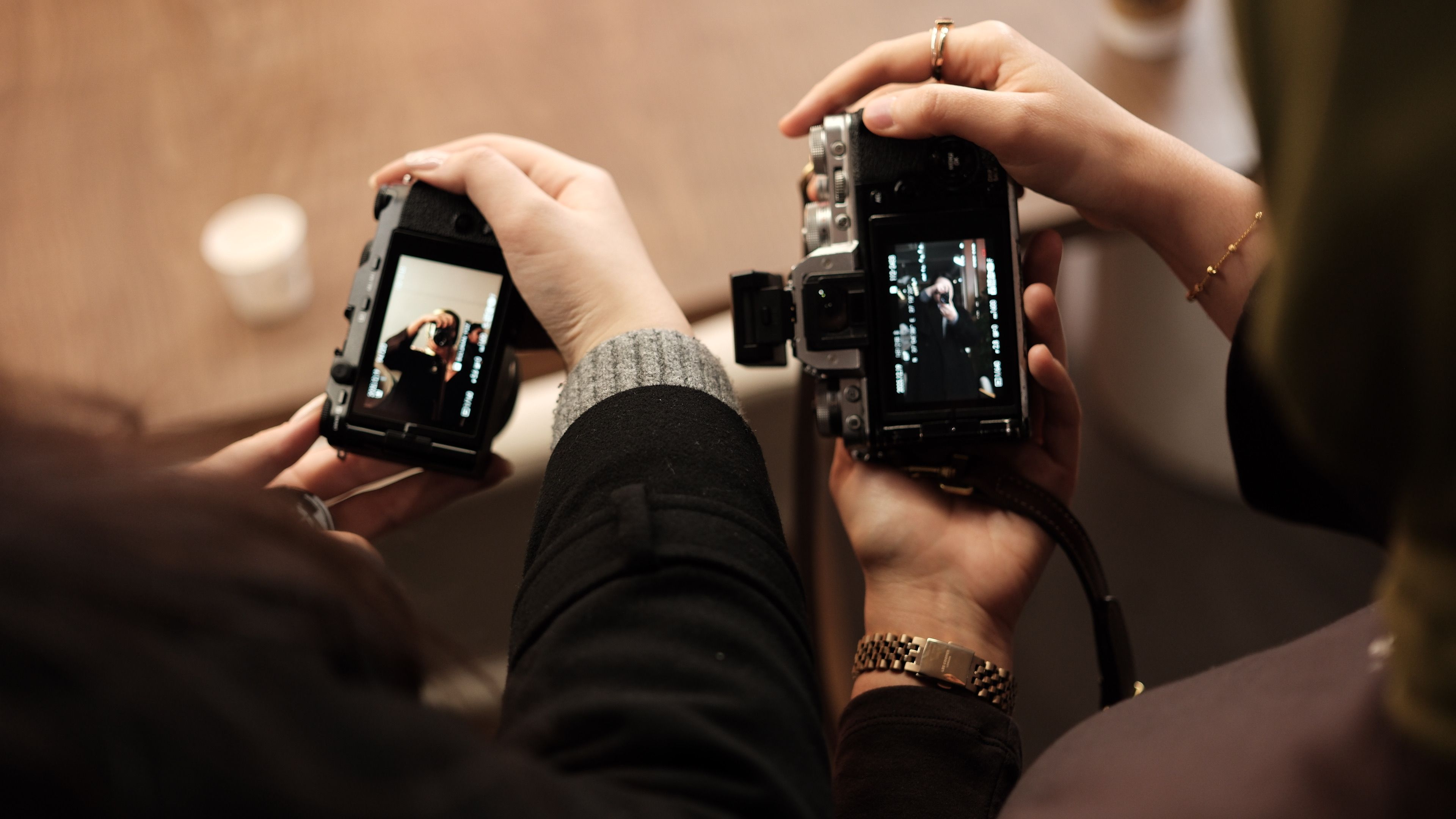 Photographers Capturing Moments Indoors · Free Stock Photo