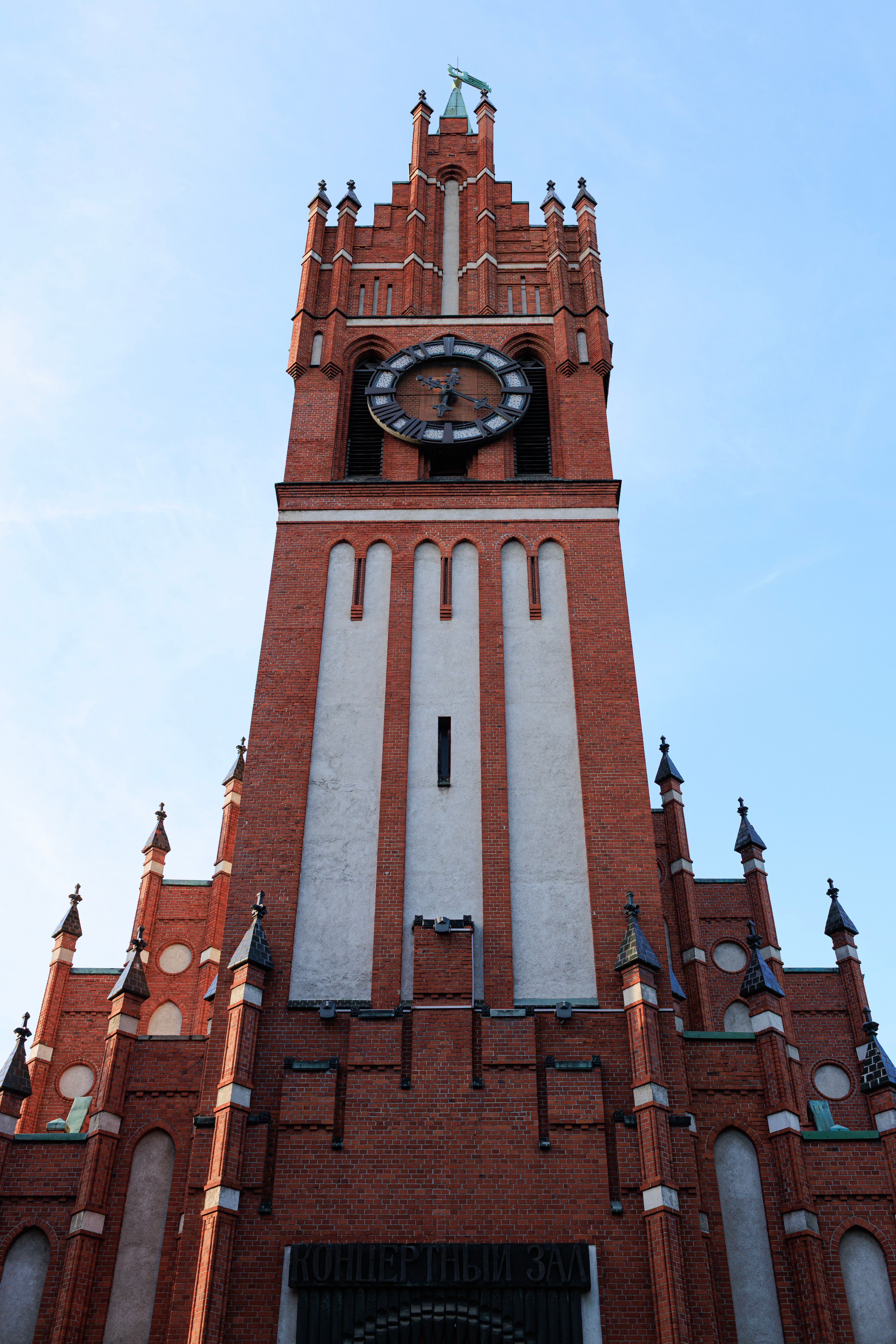 Gothic Clock Tower Against Clear Sky · Free Stock Photo