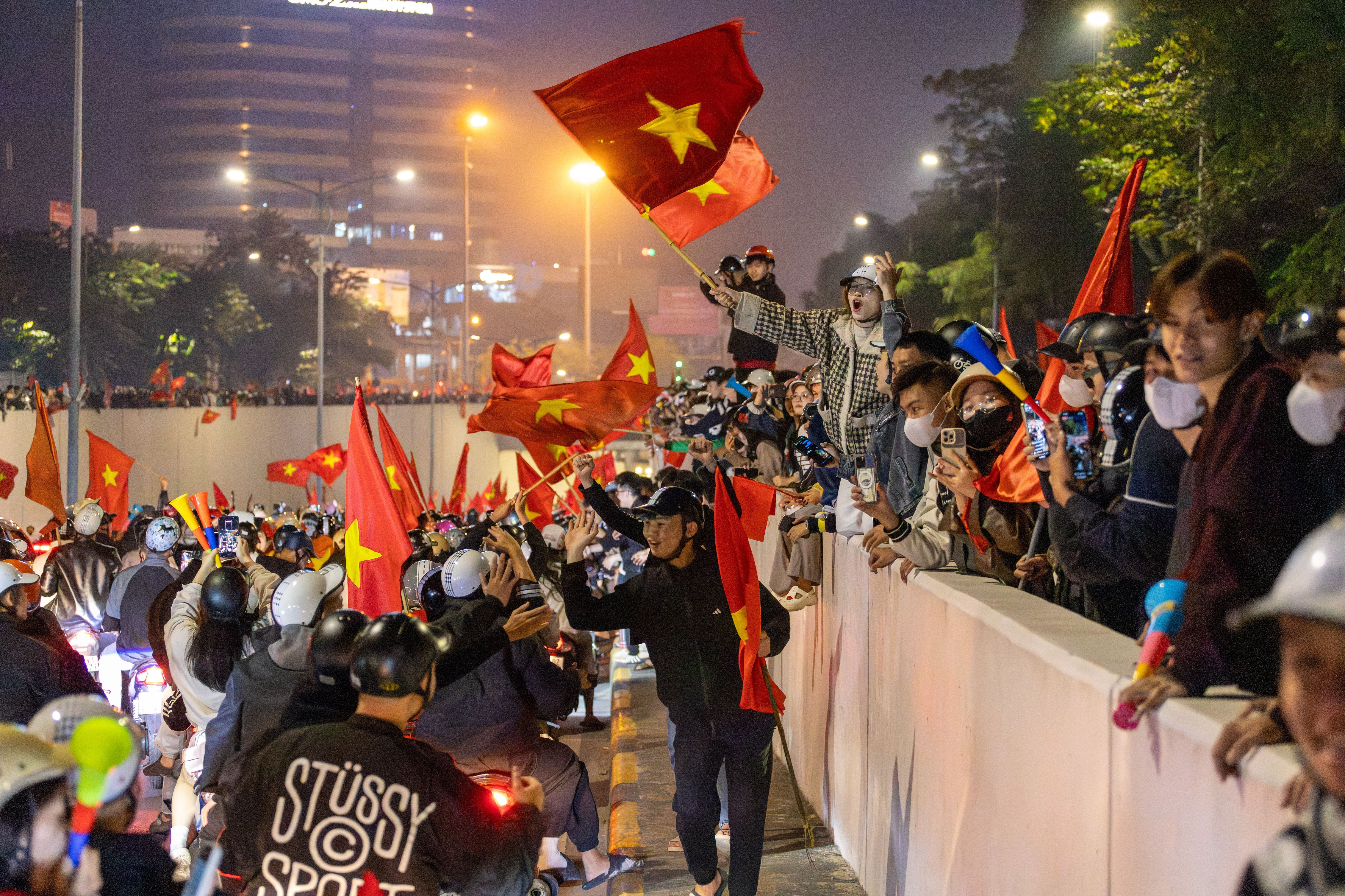Vibrant Street Celebration in Hanoi at Night · Free Stock Photo