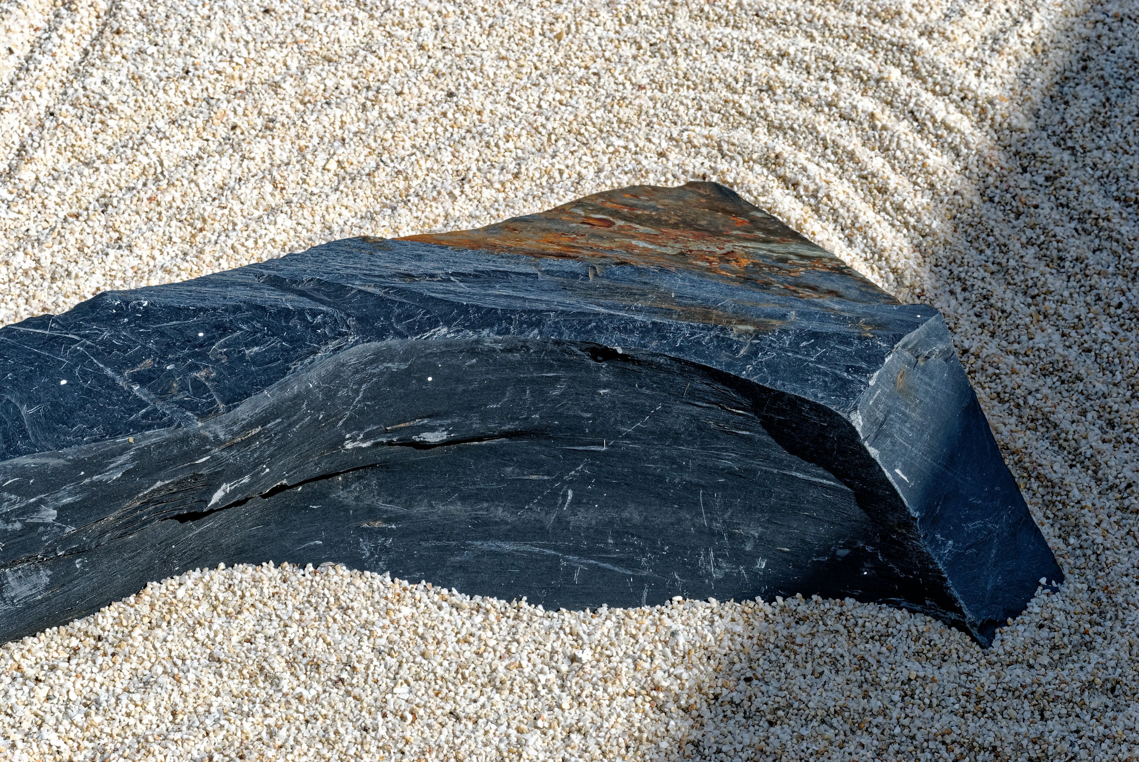 Zen Garden Rock on Raked Gravel · Free Stock Photo