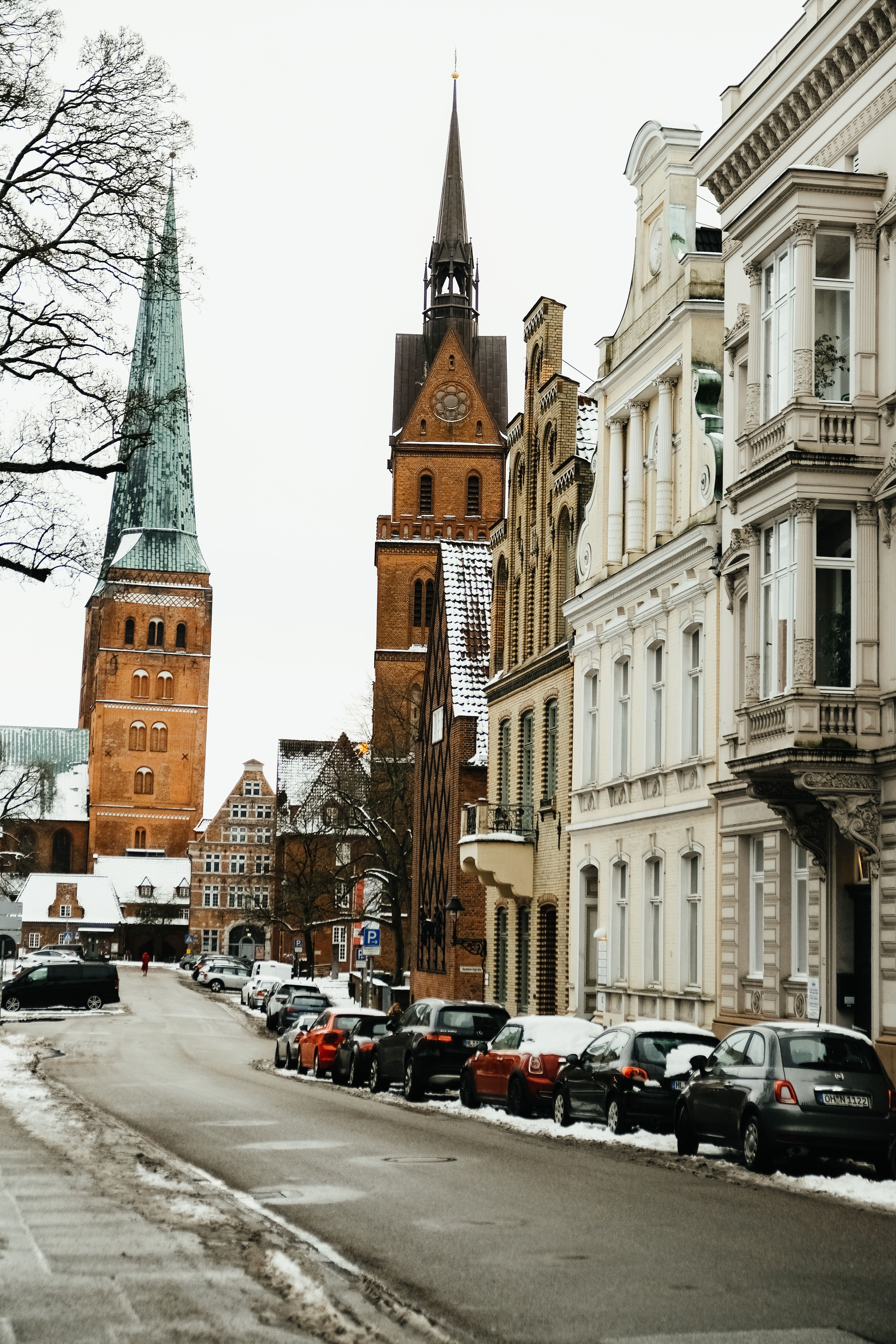 Historic Winter Street View with Gothic Church Spires · Free Stock Photo