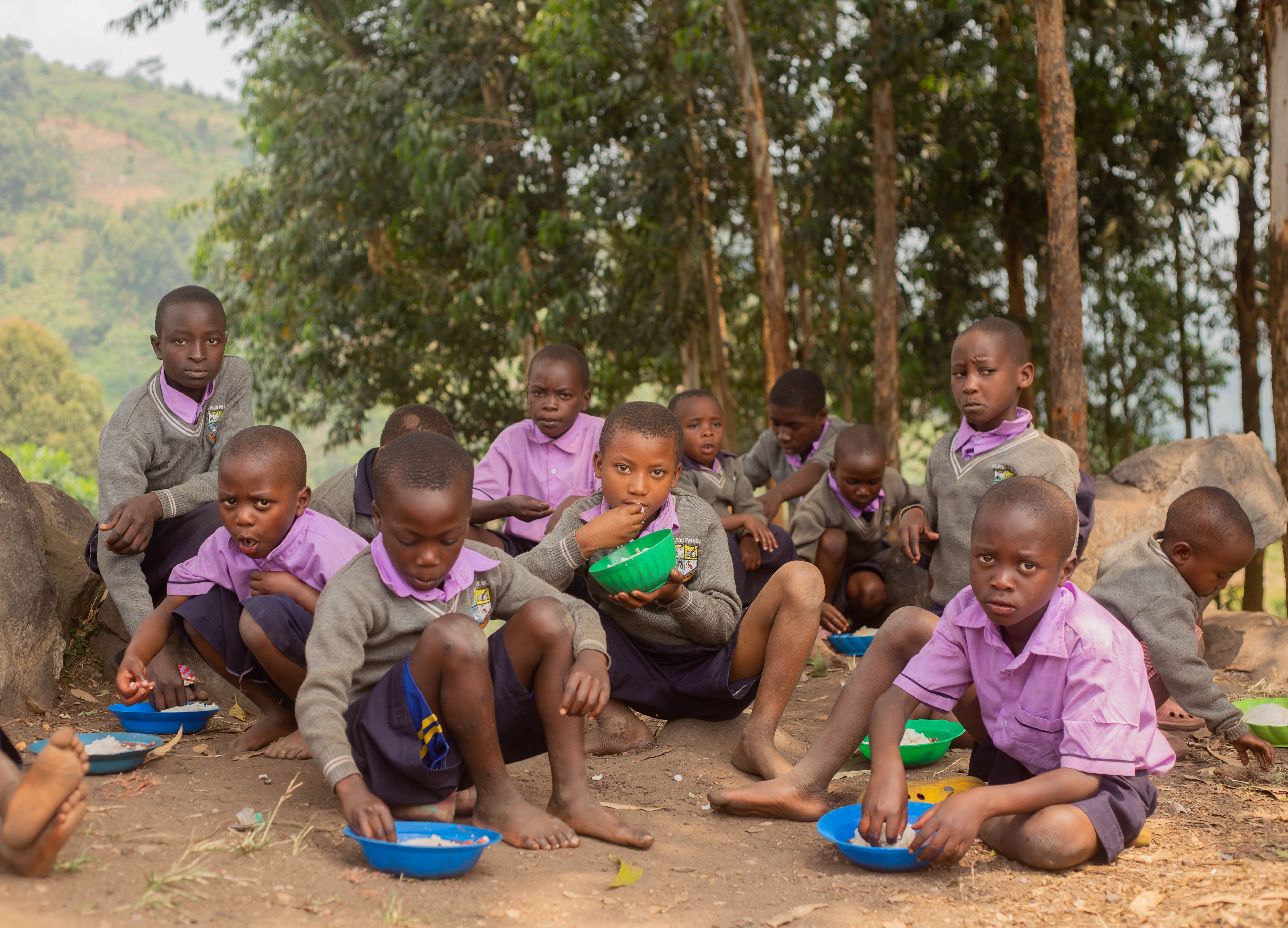 Children Eating Outdoors in a Rural Setting · Free Stock Photo