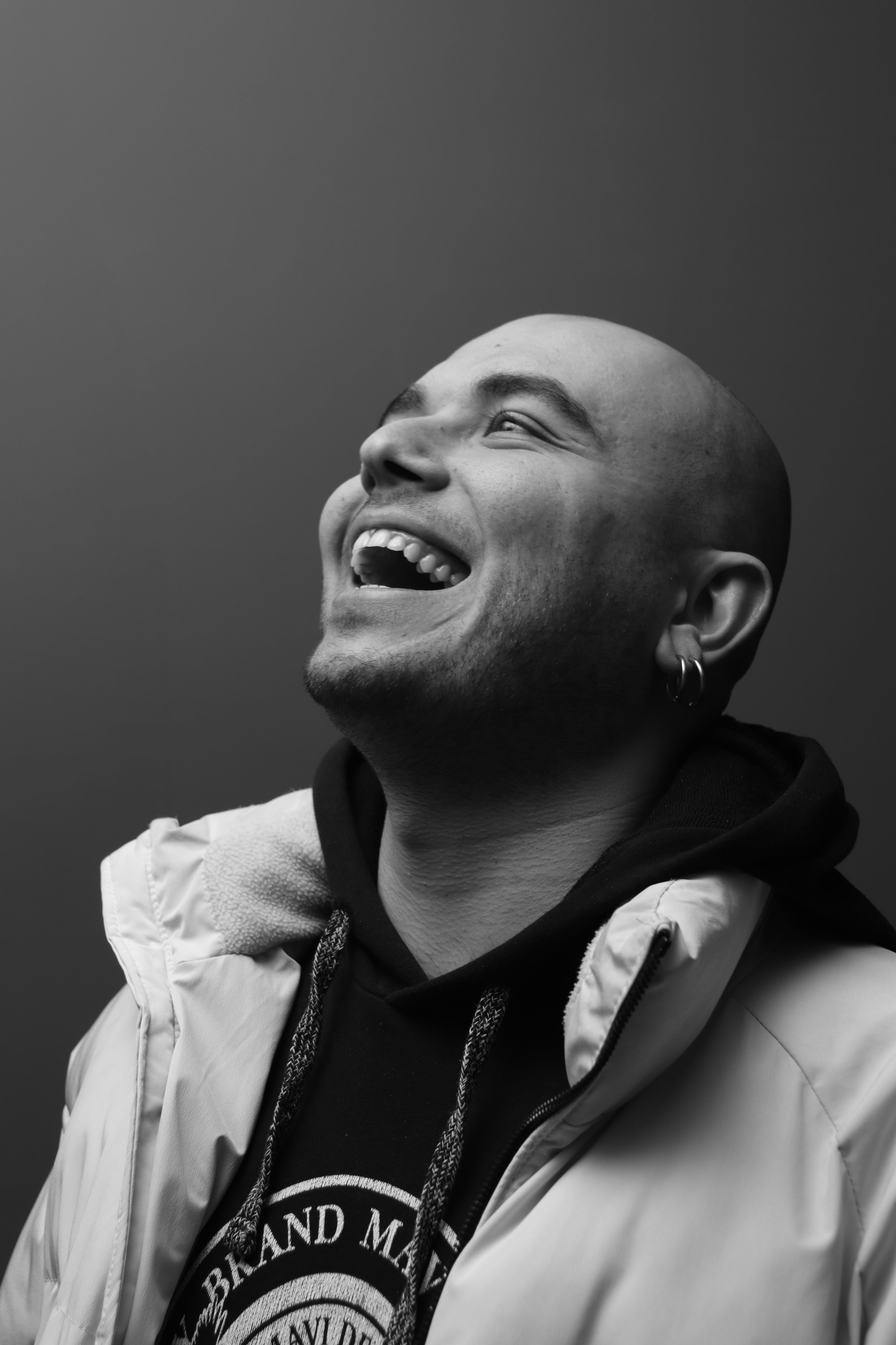 Black and White Portrait of Smiling Man · Free Stock Photo