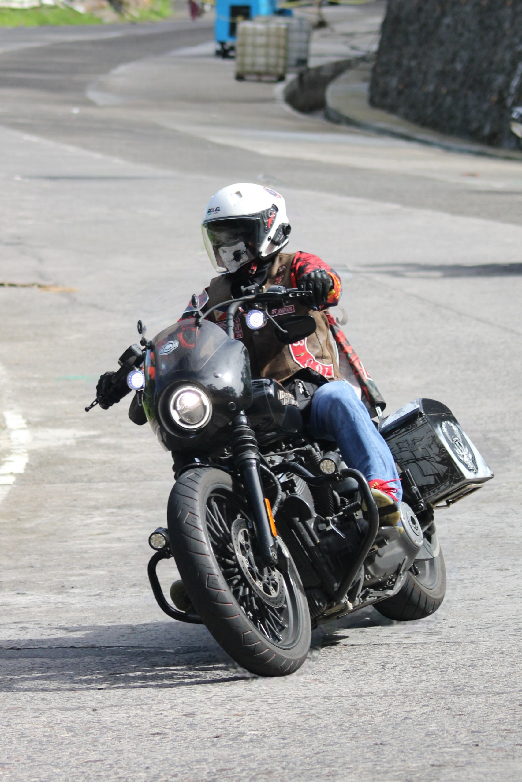 Motorcyclist Riding a Cruiser on a Curve · Free Stock Photo