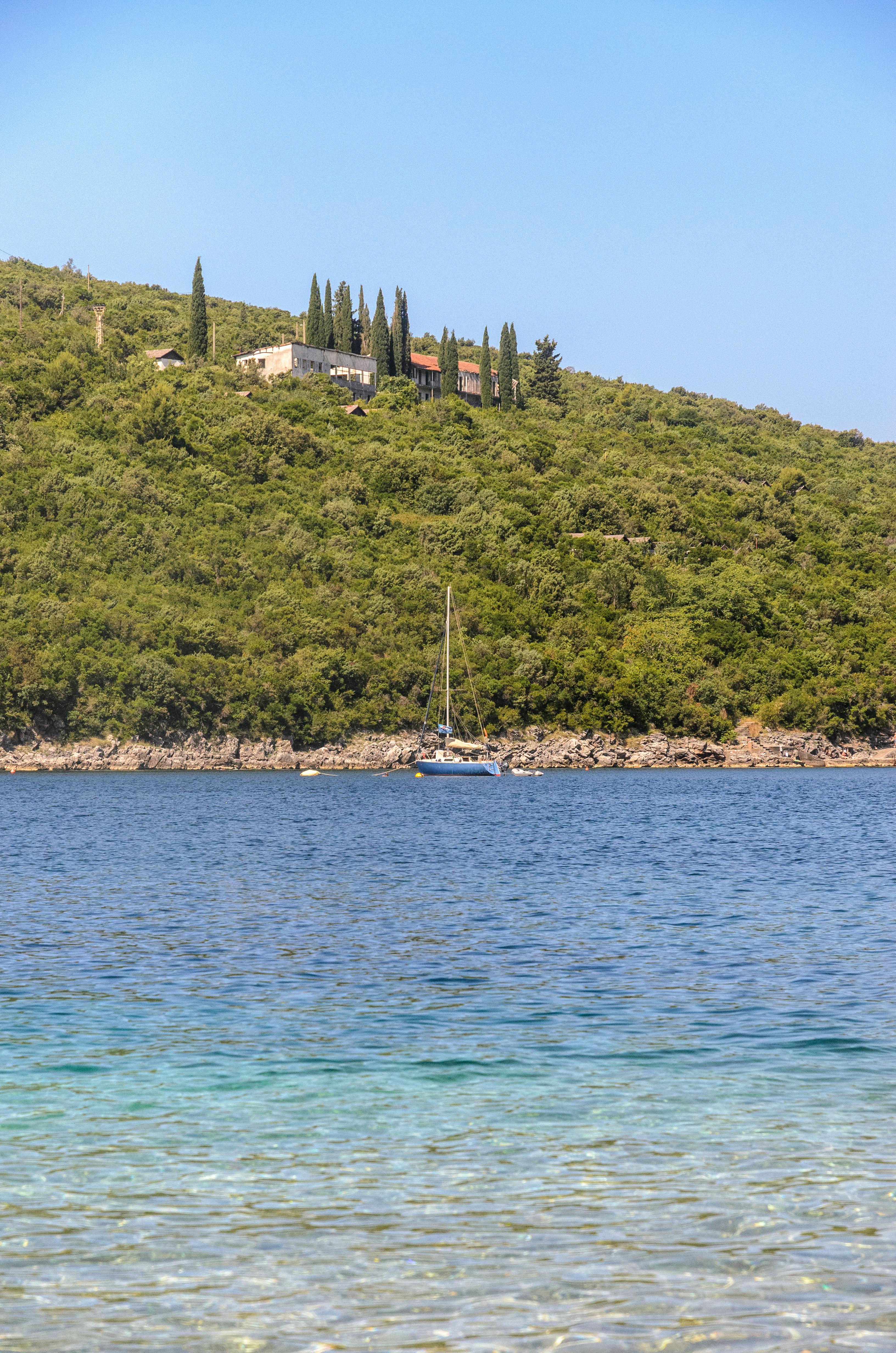 Sailboat on Turquoise Waters in Bigova, Montenegro · Free Stock Photo