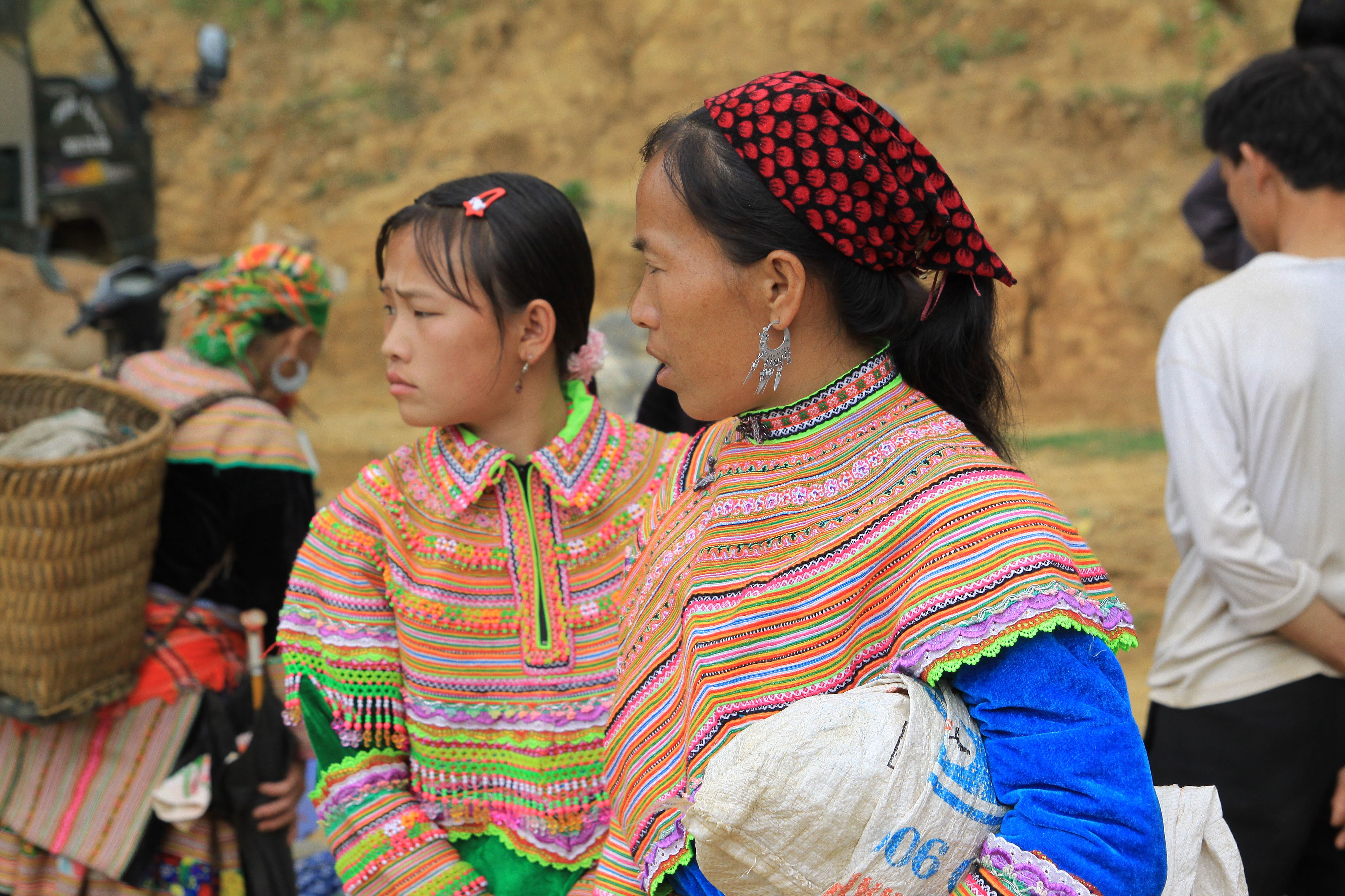 Colorful Traditional Attire of Southeast Asian Women · Free Stock Photo