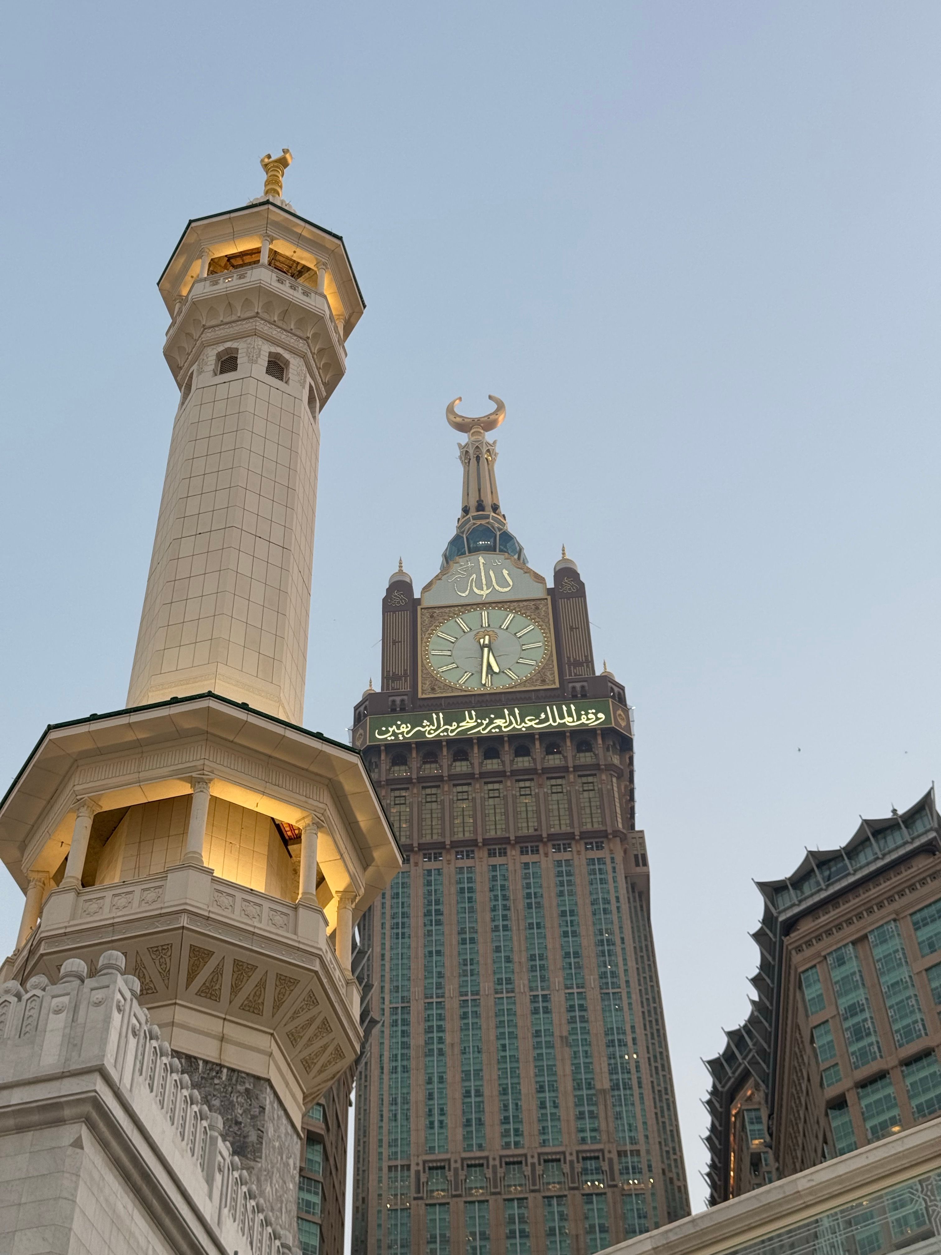 Mecca Royal Clock Tower and Minaret at Dusk · Free Stock Photo