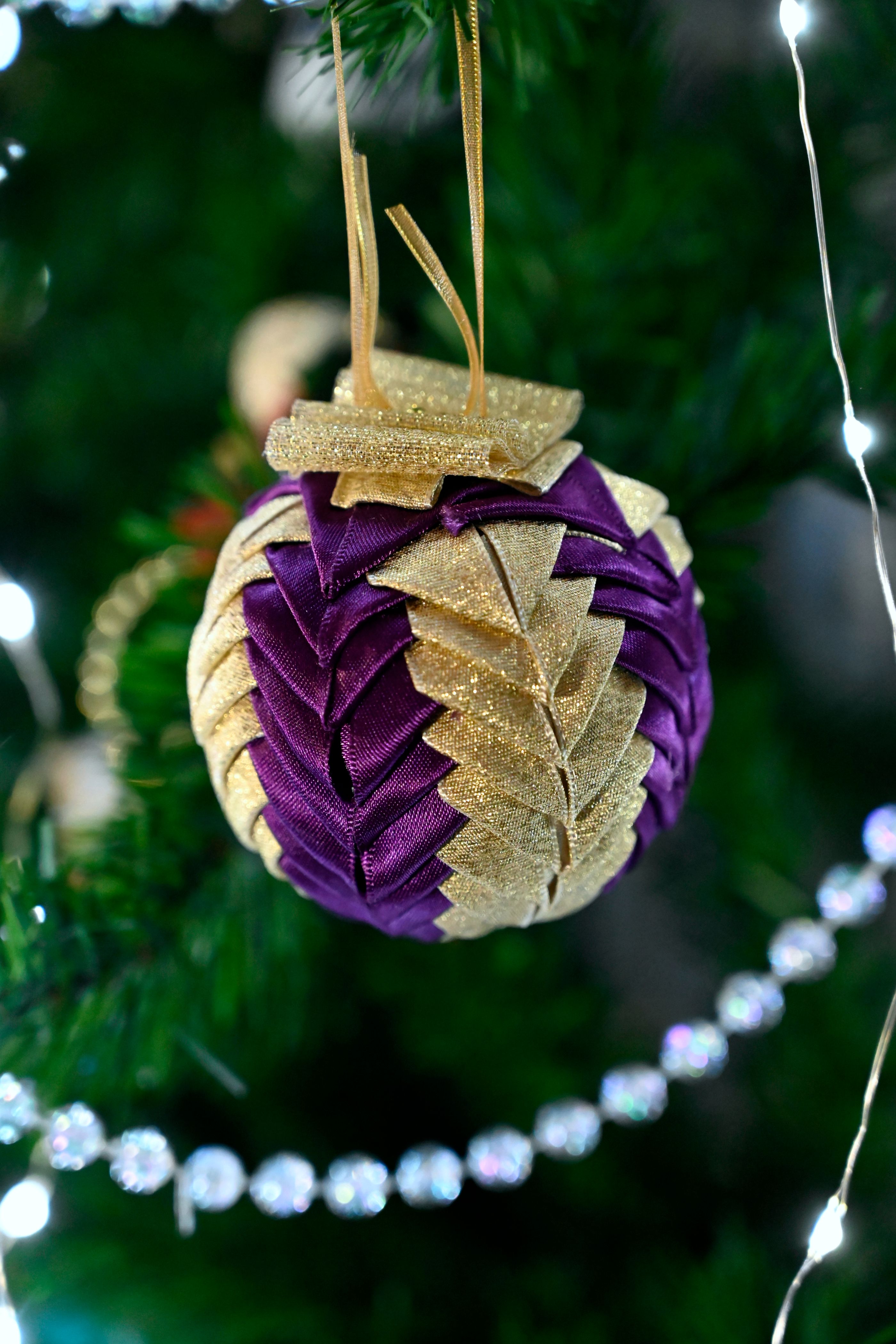 Elegant Purple and Gold Christmas Ornament on Tree · Free Stock Photo