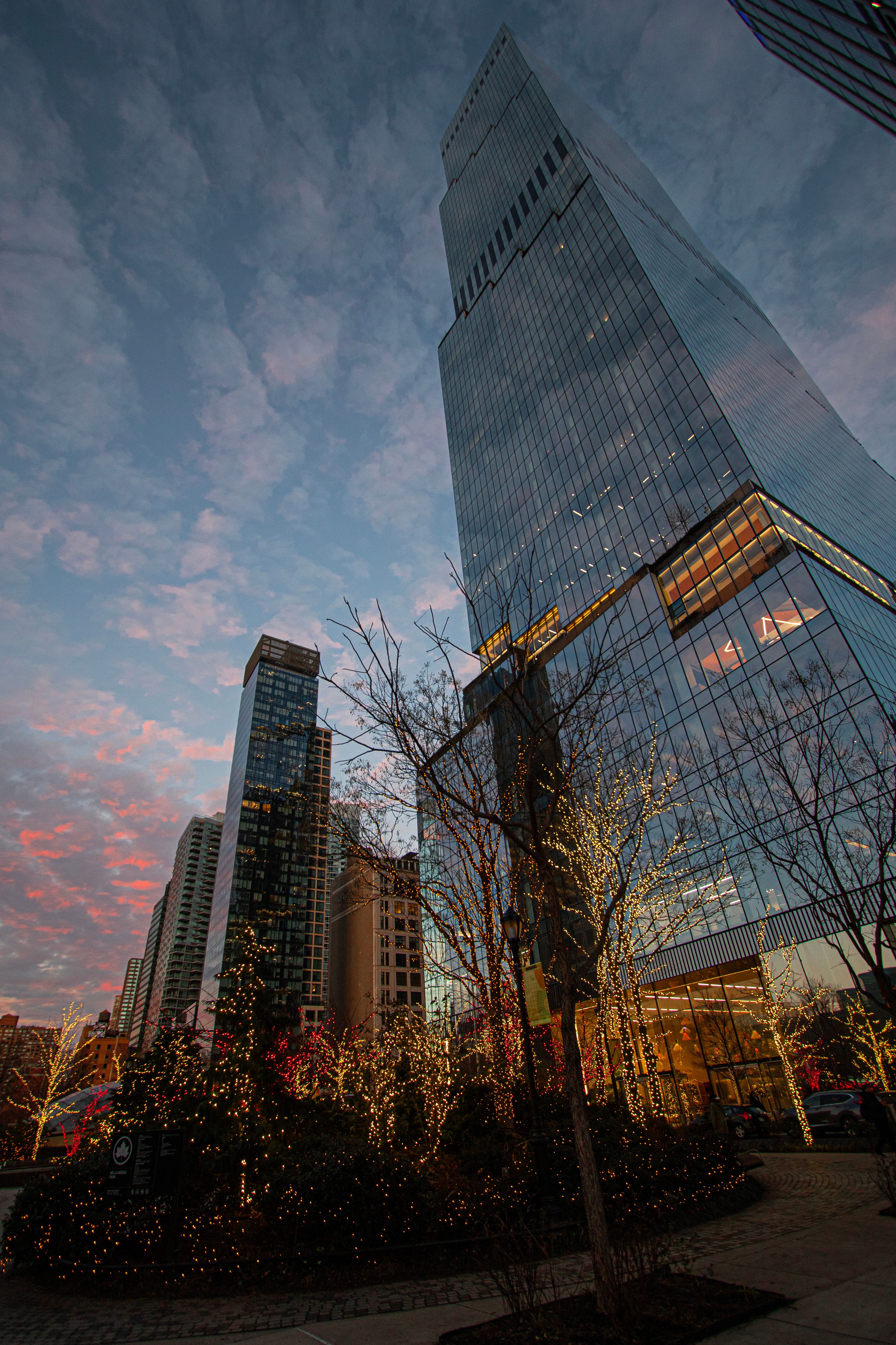 New York Skyscraper at Sunset with Festive Lights · Free Stock Photo