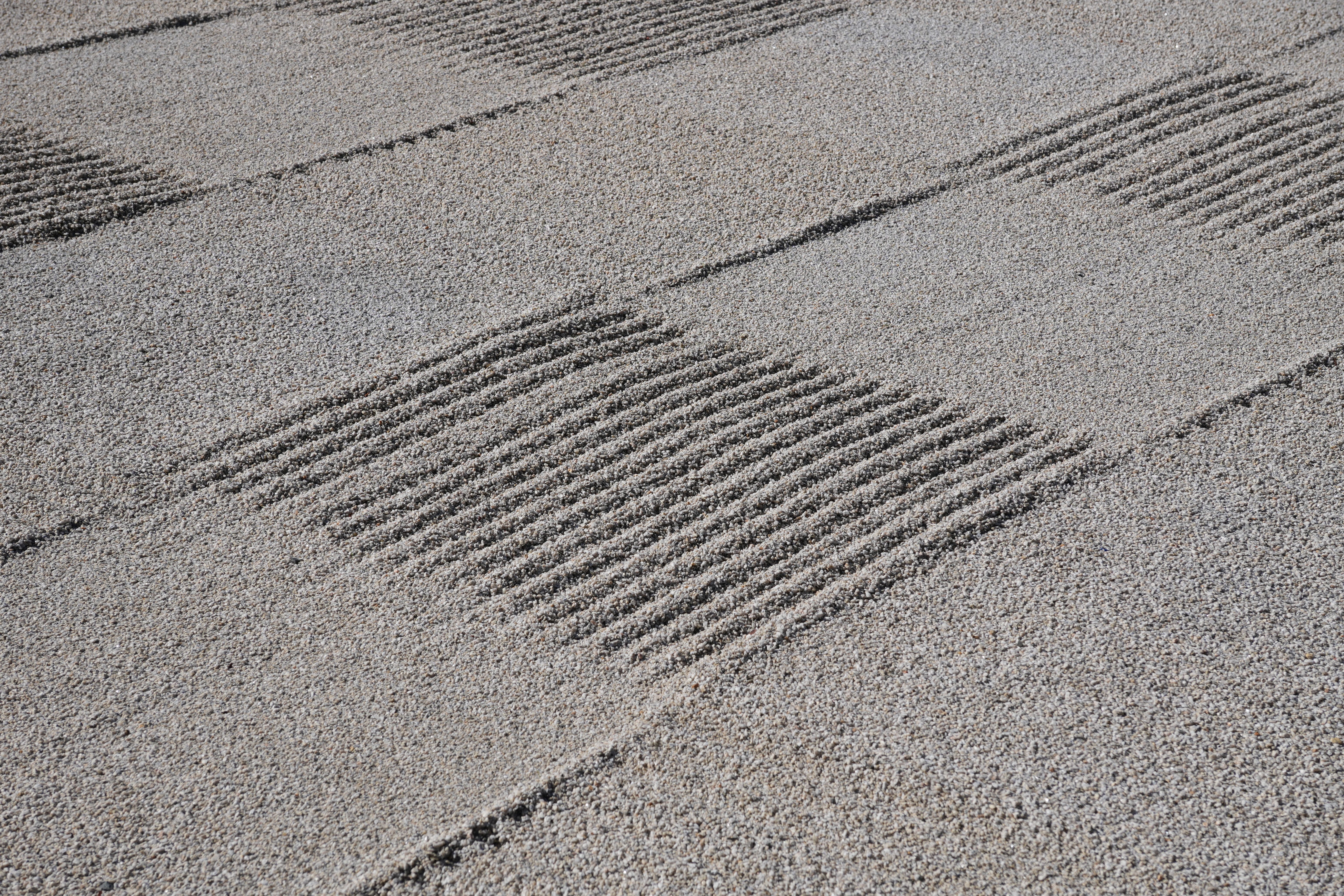 Zen Garden Raked Gravel Patterns in Kyoto · Free Stock Photo