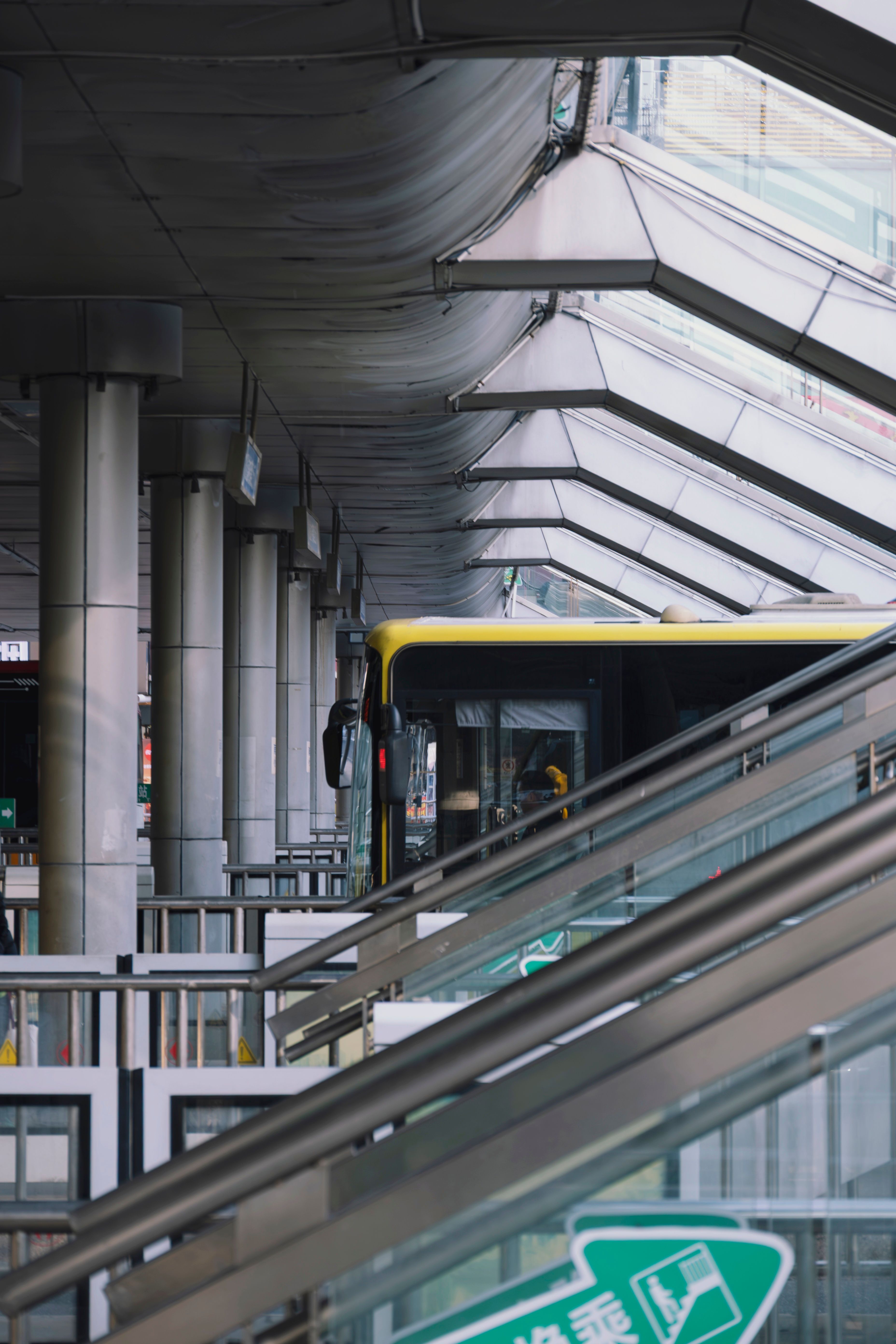 Modern Urban Bus Station with Glass Roof · Free Stock Photo