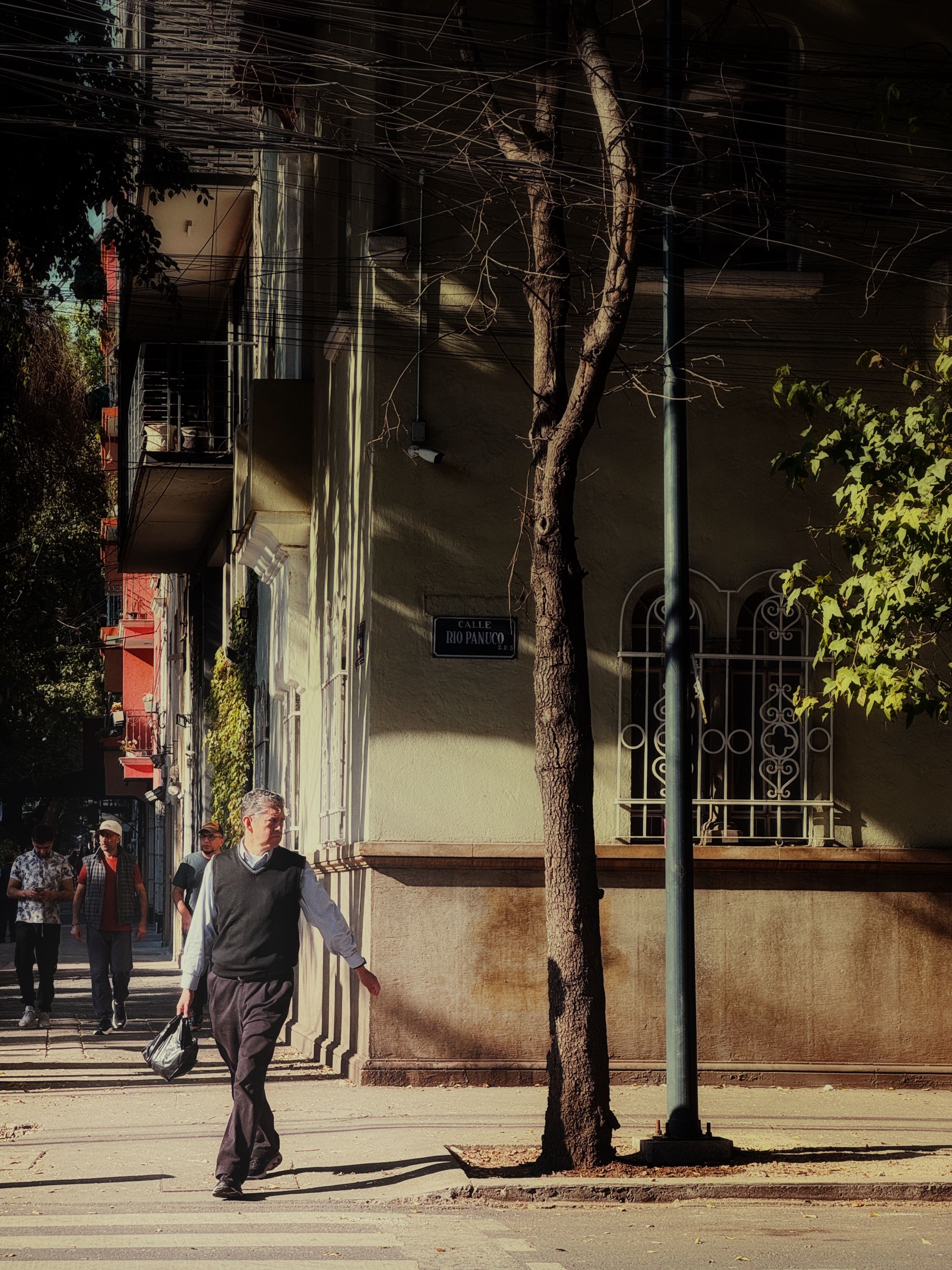 Urban Street Scene with Pedestrian in Daylight · Free Stock Photo