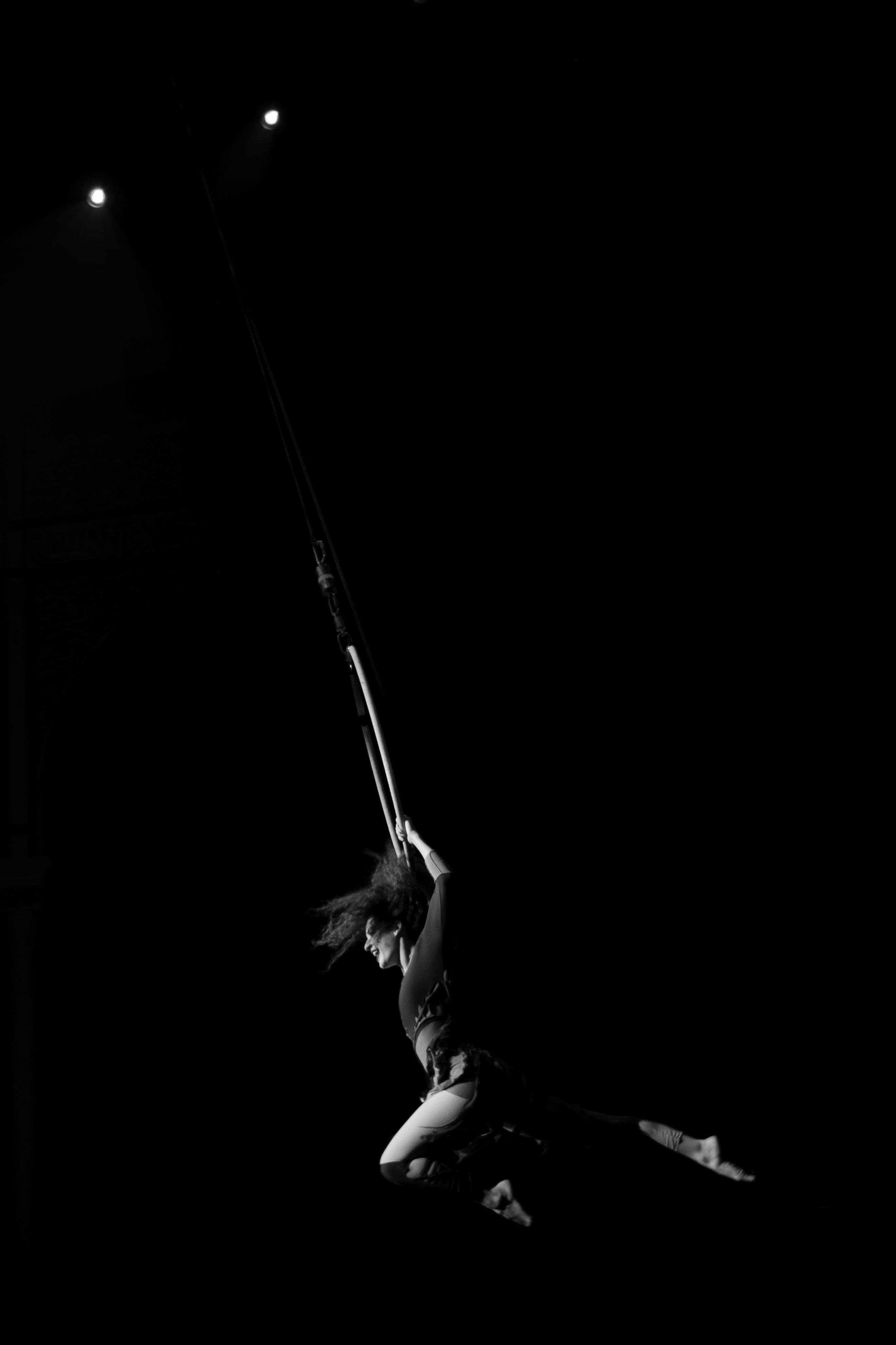 Dramatic Aerial Performer in Spotlight · Free Stock Photo