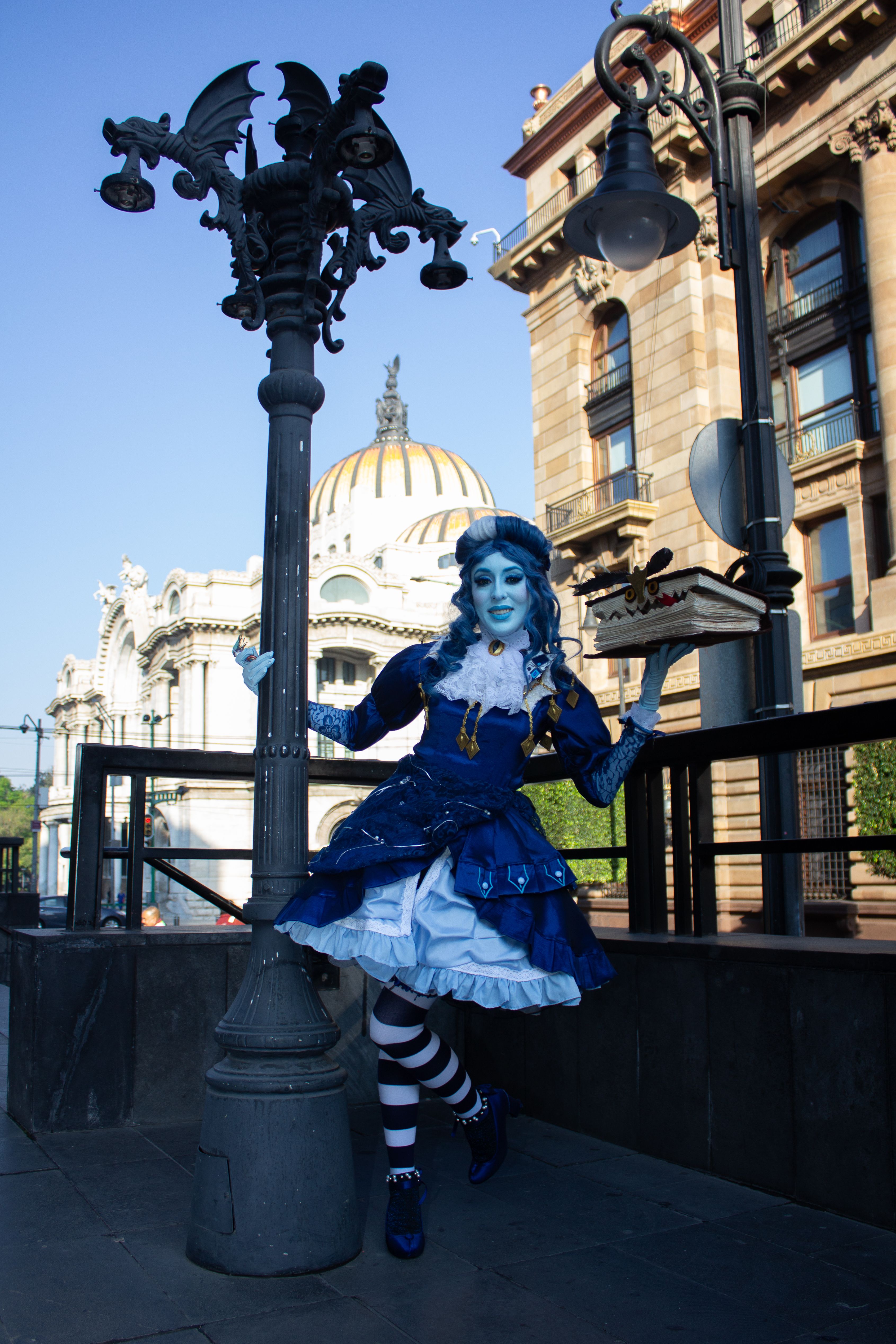 Cosplayer in Blue Costume Near Palacio de Bellas Artes · Free Stock Photo