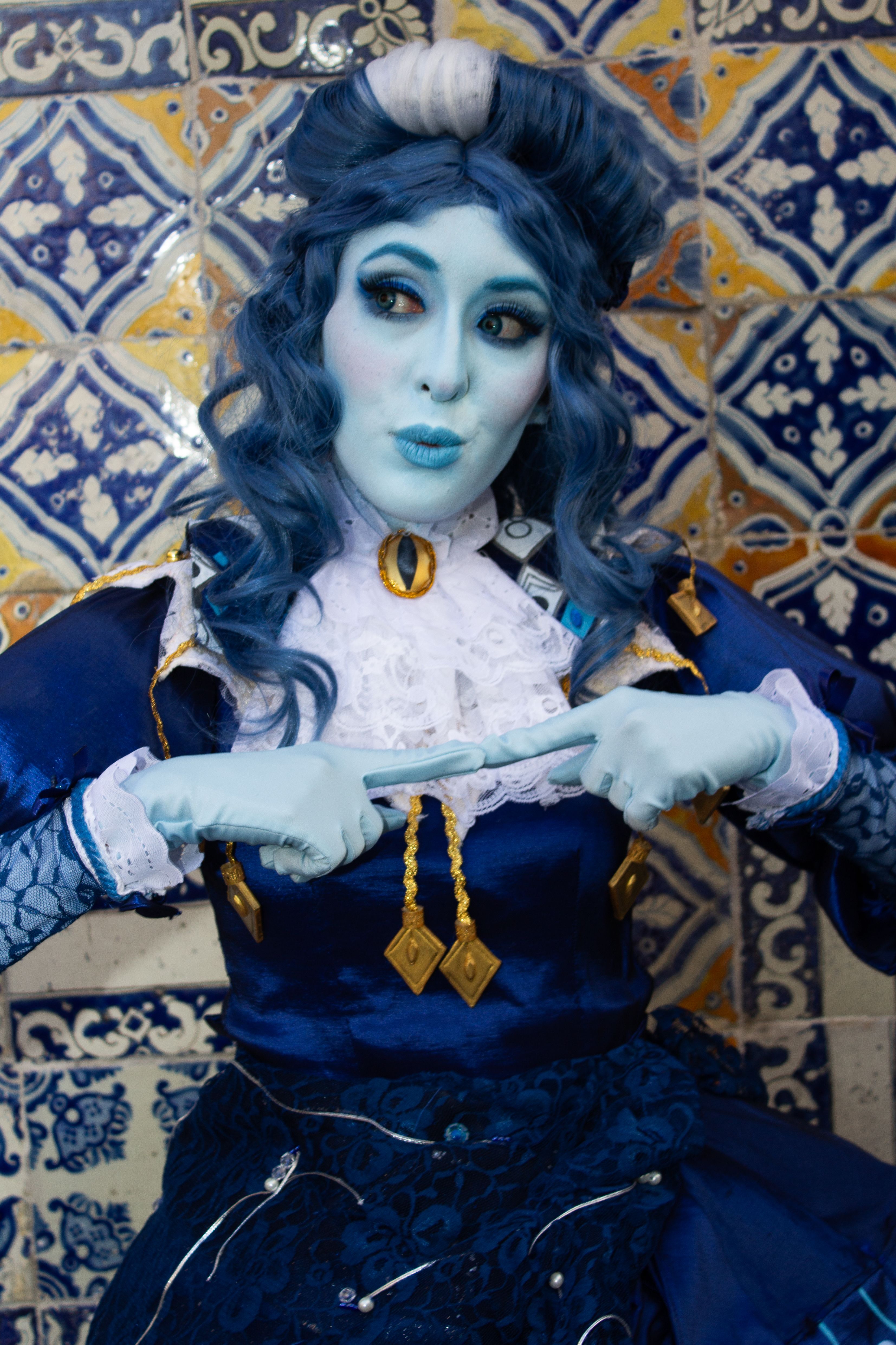 Whimsical Cosplayer with Blue Skin and Vintage Outfit · Free Stock Photo