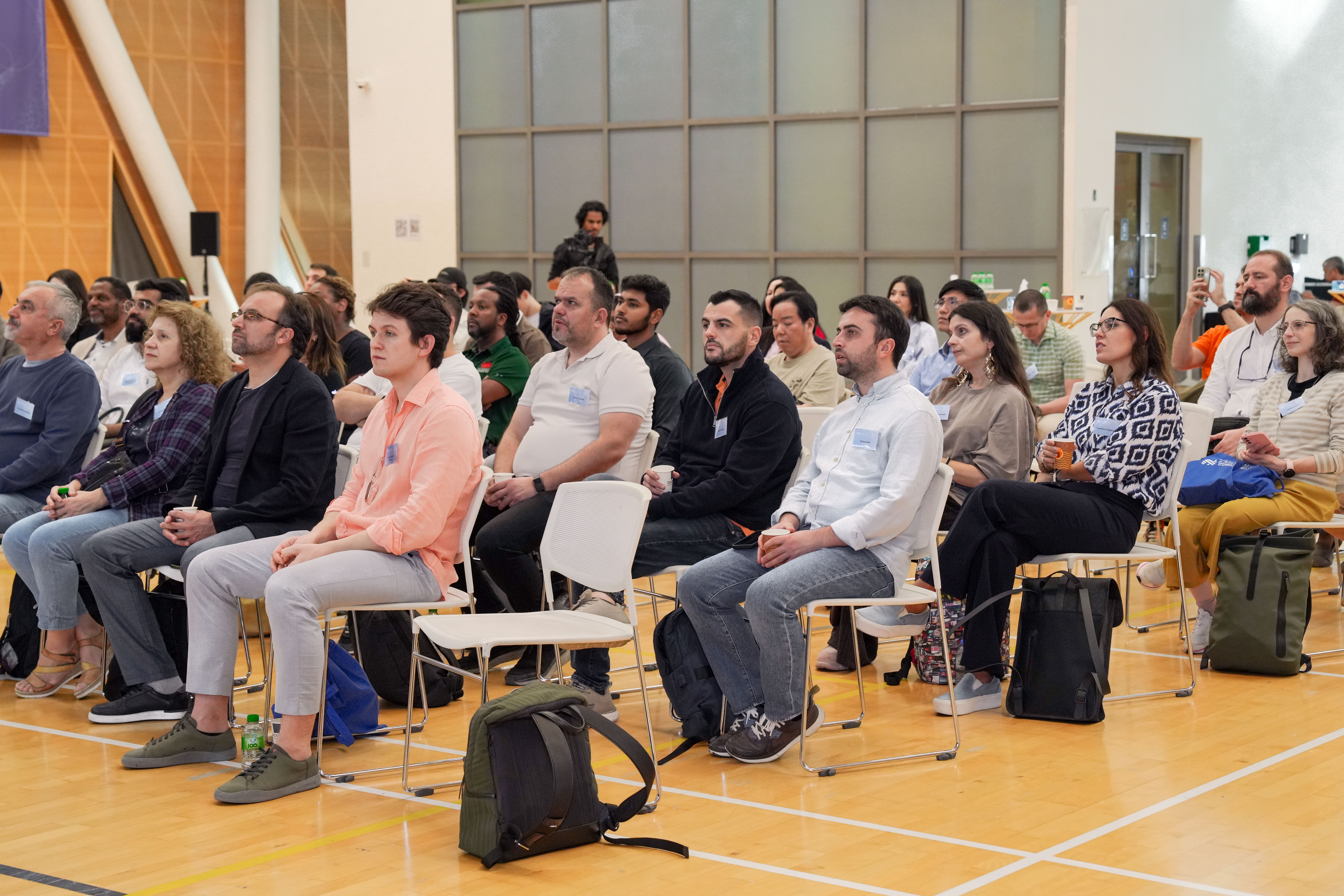 Diverse Audience Attending Indoor Conference · Free Stock Photo
