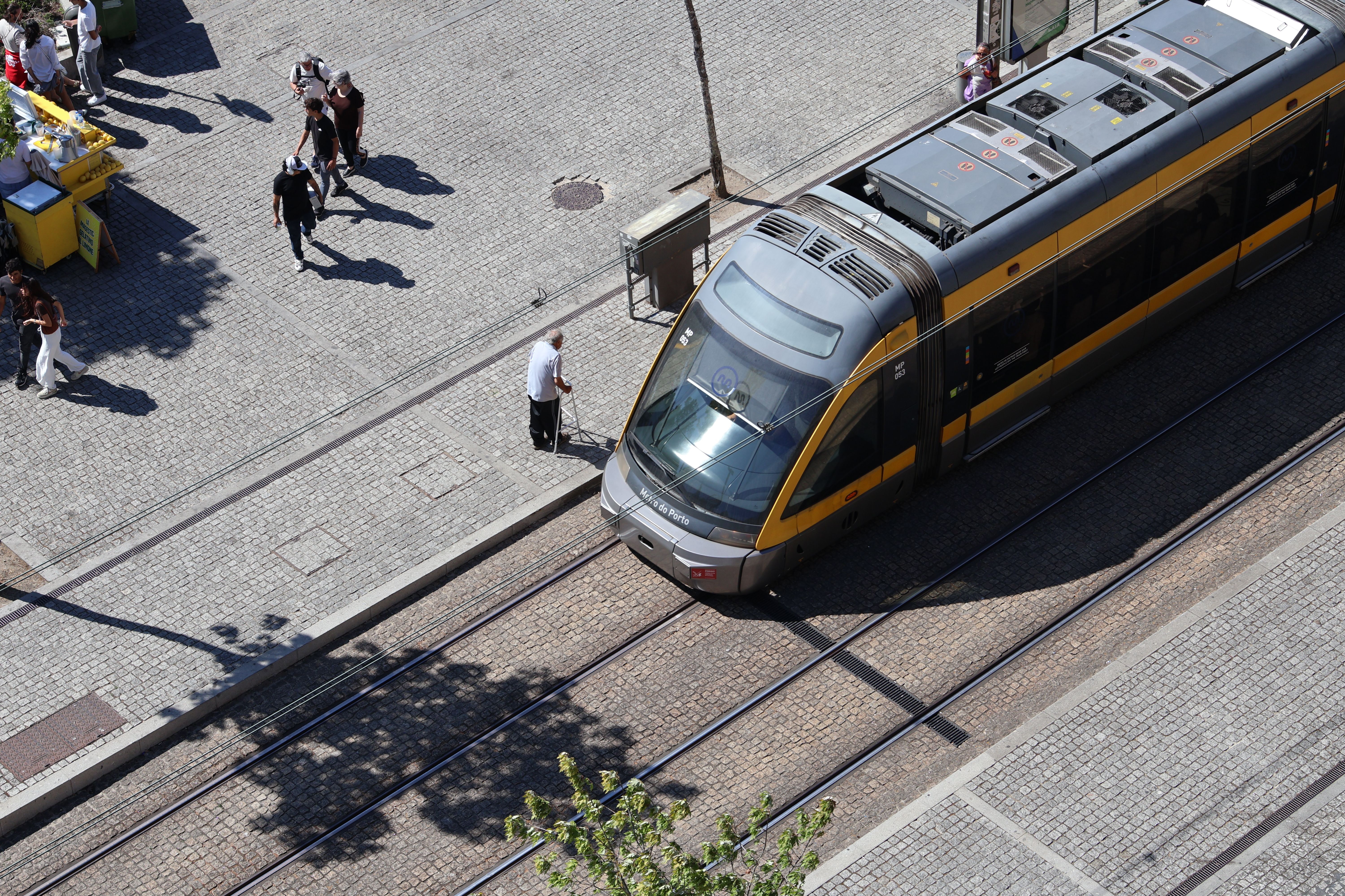 Aerial View of Tram on Porto Street Tracks · Free Stock Photo