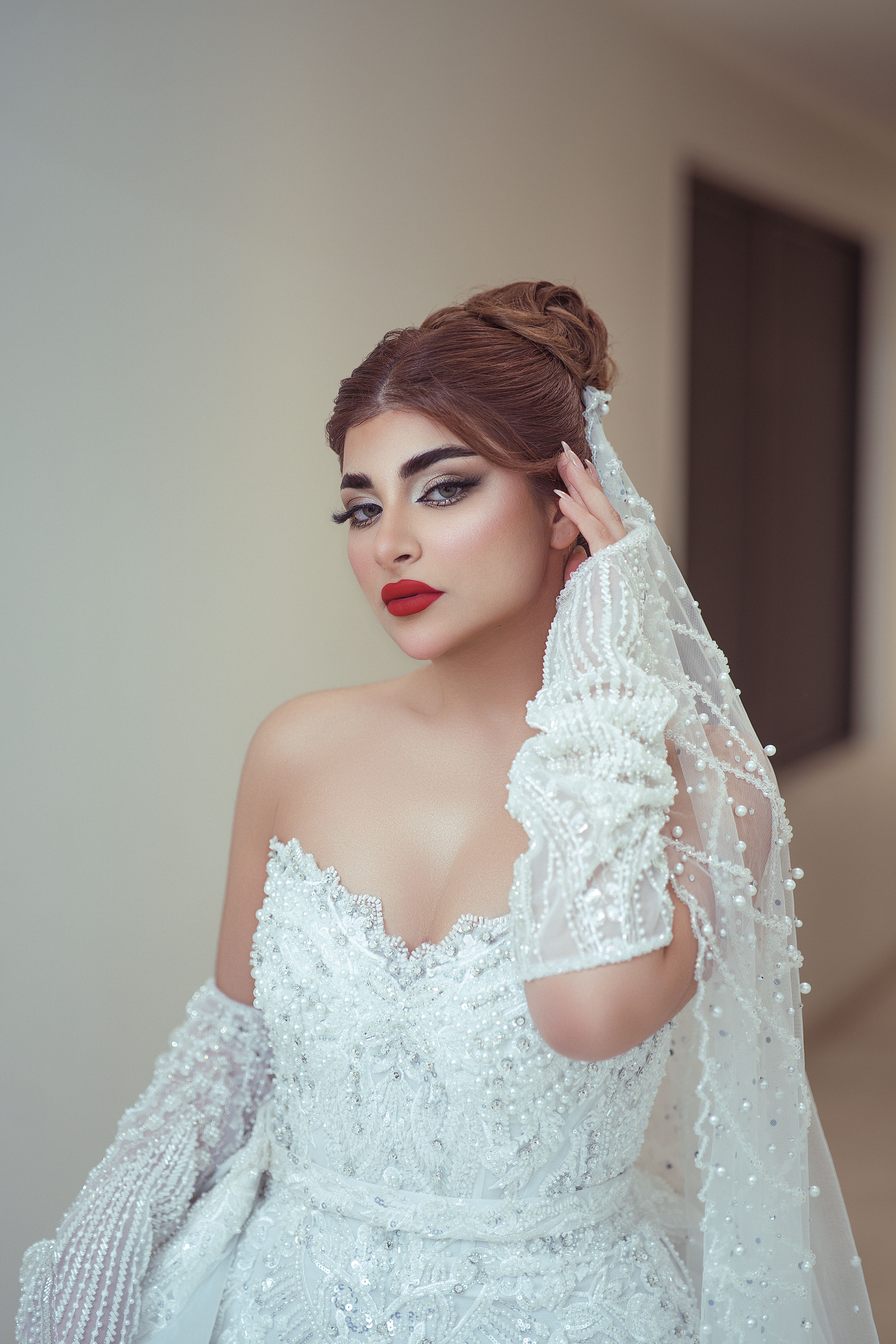 Elegant Bride in Intricate Pearl Wedding Gown · Free Stock Photo