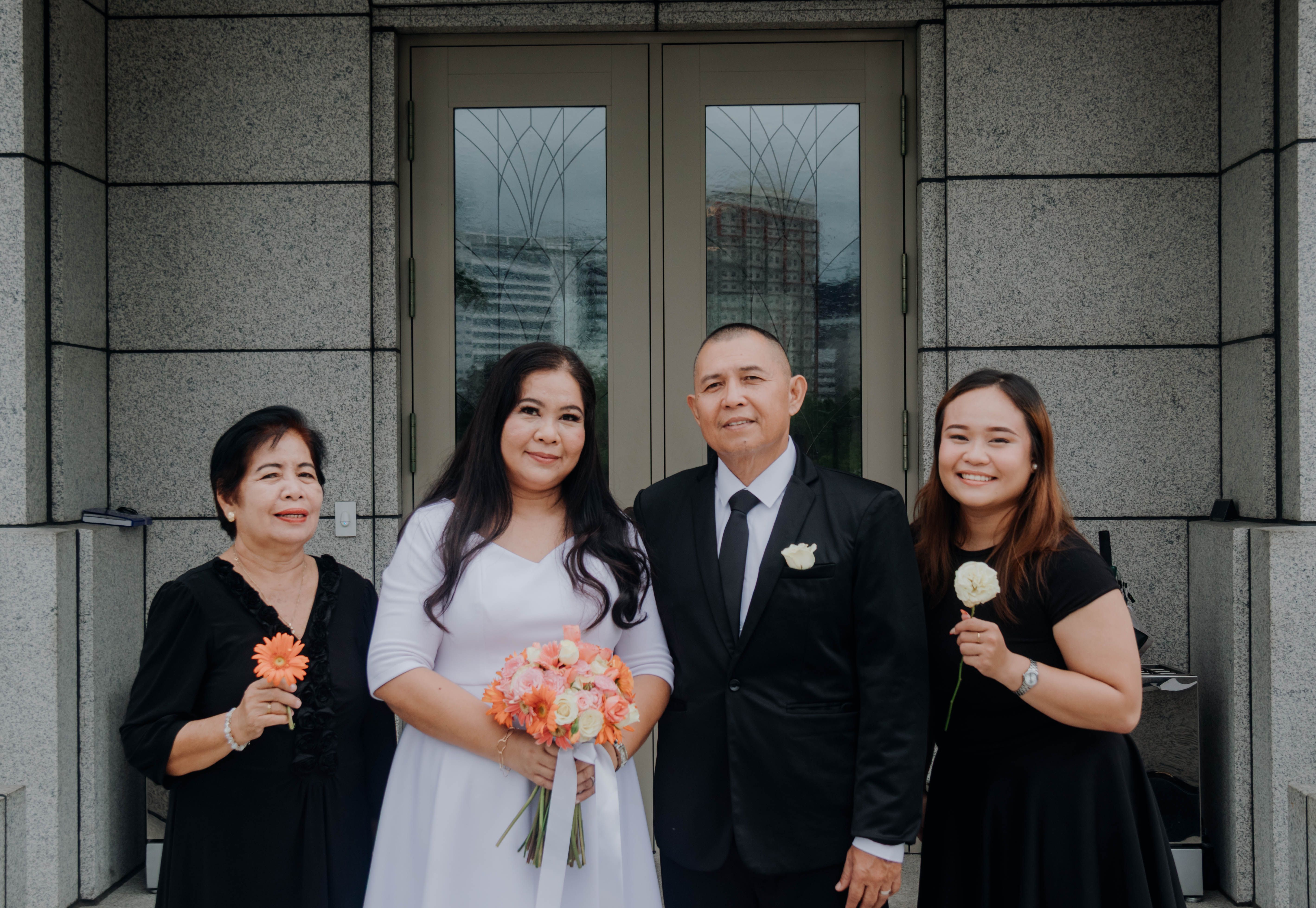 Joyful Family Wedding Portrait in Cebu City · Free Stock Photo