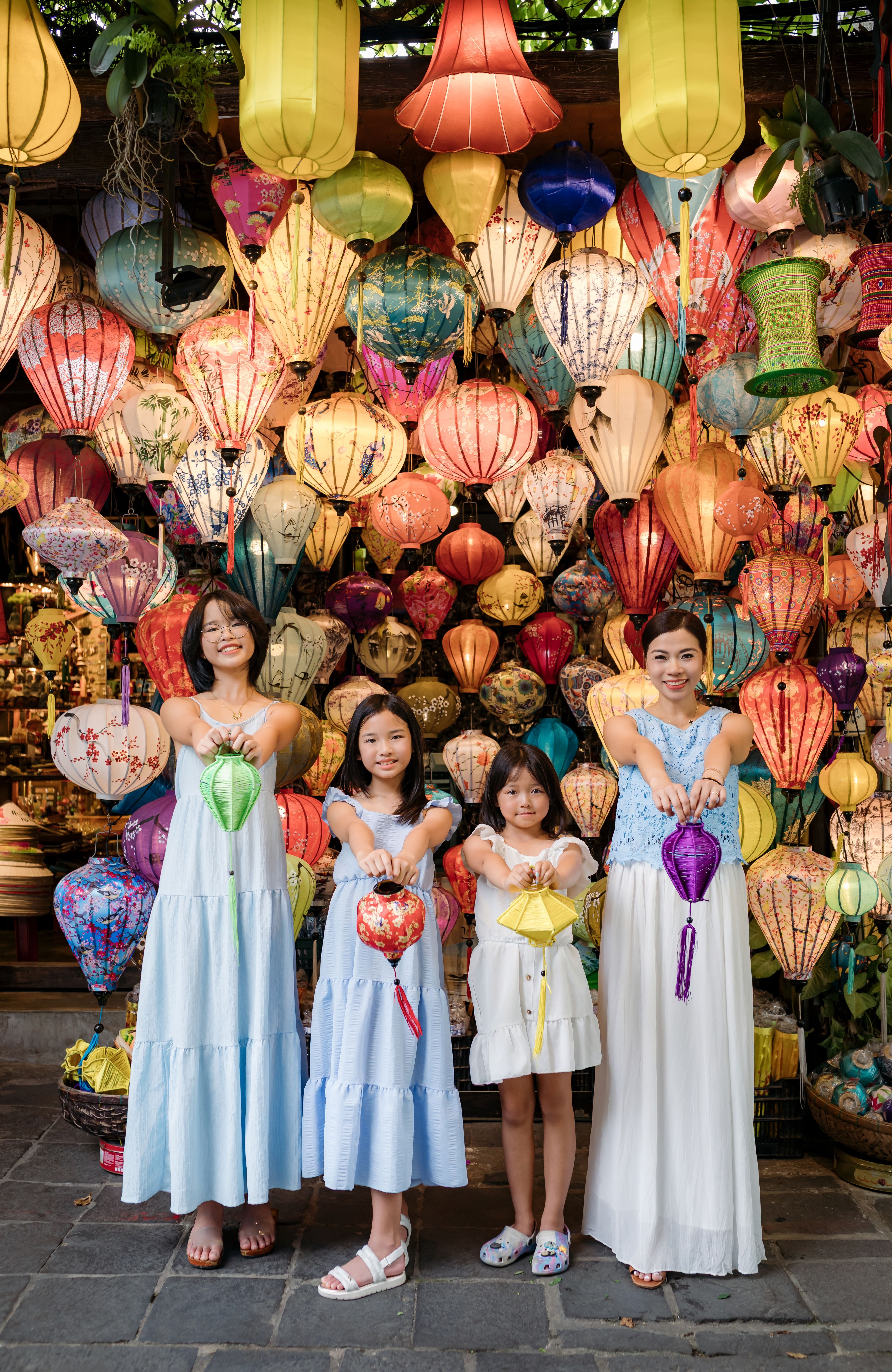Family with Lanterns at Hoi An Market · Free Stock Photo