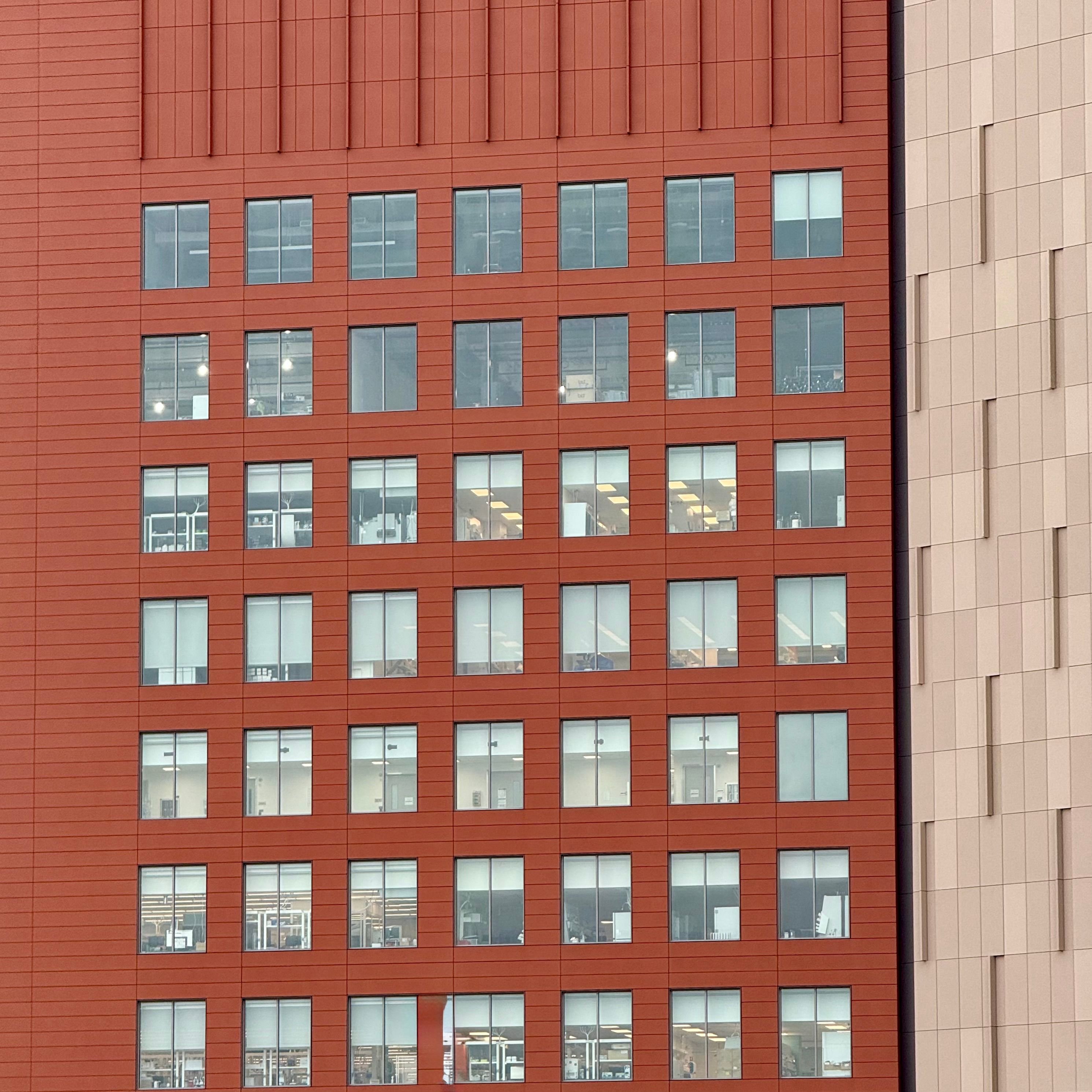 Red Office Building with Grid of Windows · Free Stock Photo
