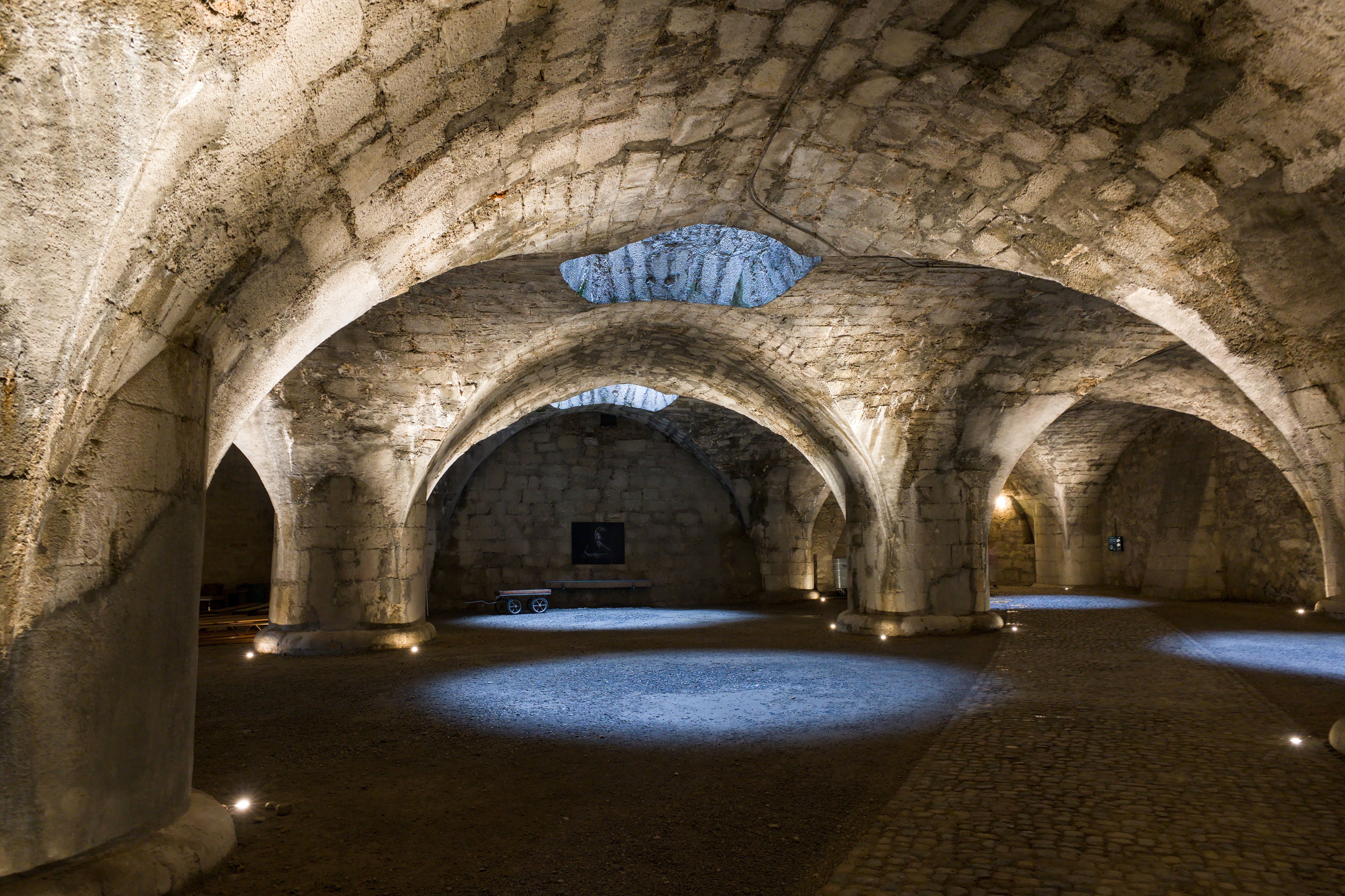 Historic Stone Vaulted Hall with Arched Ceilings · Free Stock Photo