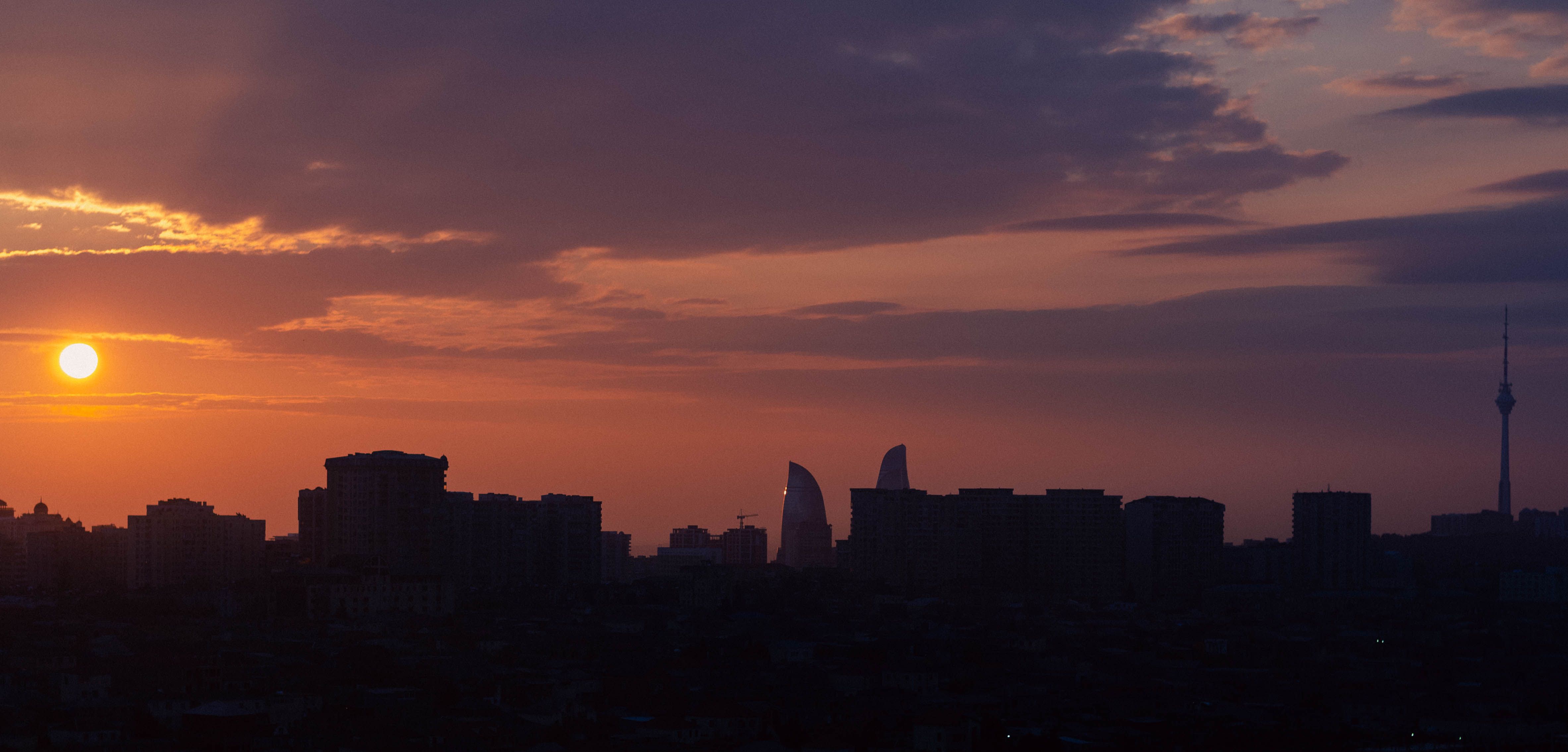 Baku Skyline at Sunset with Flame Towers · Free Stock Photo