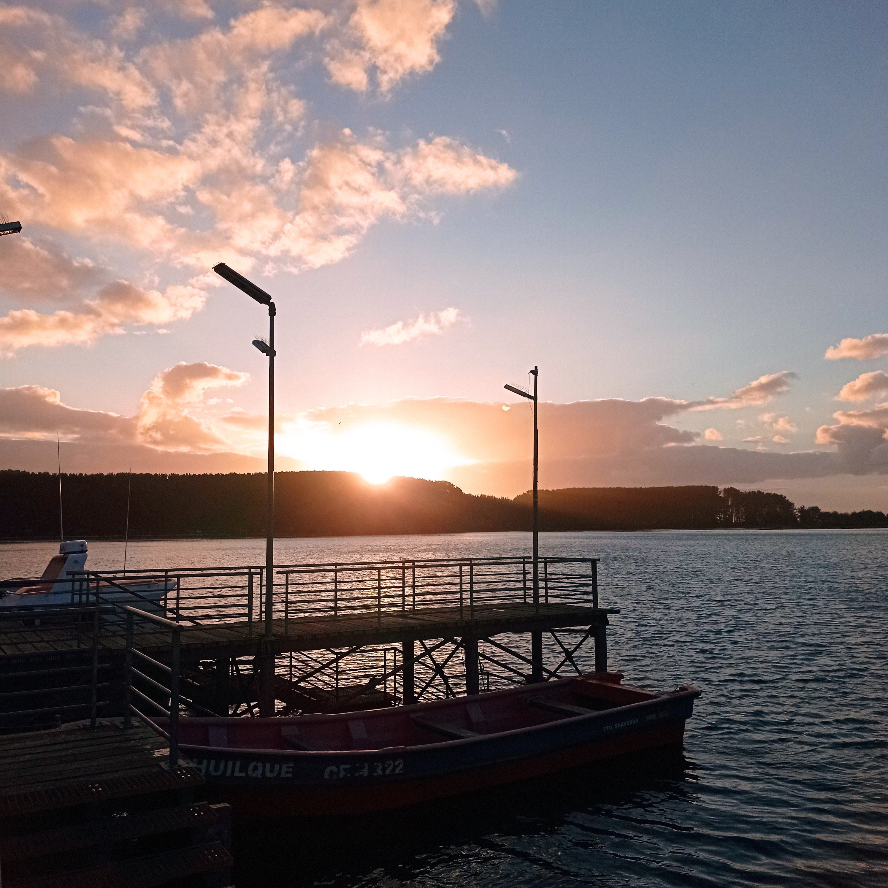 Scenic Sunrise Over a Lakeside Dock · Free Stock Photo