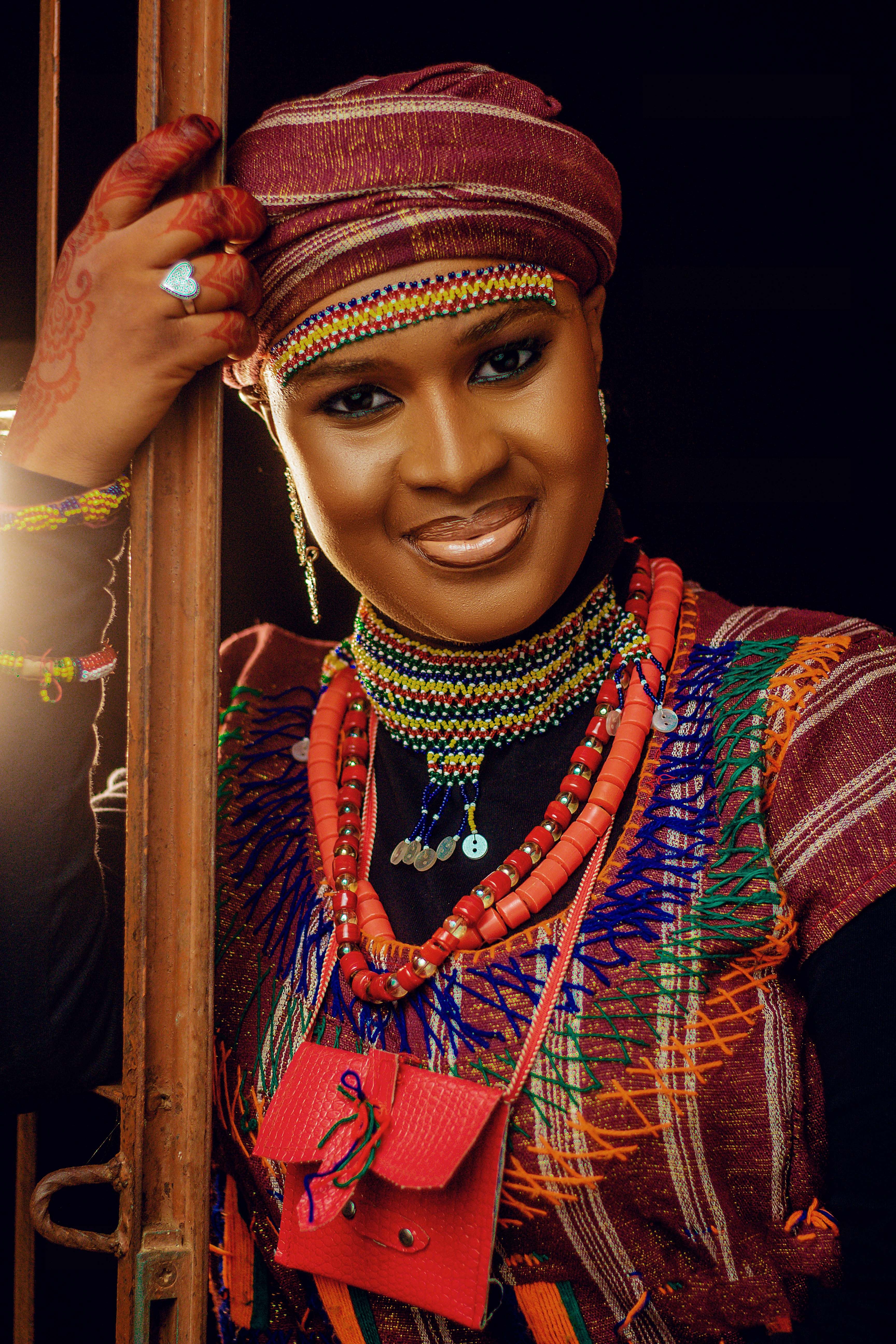 Colorful African Traditional Attire Portrait · Free Stock Photo