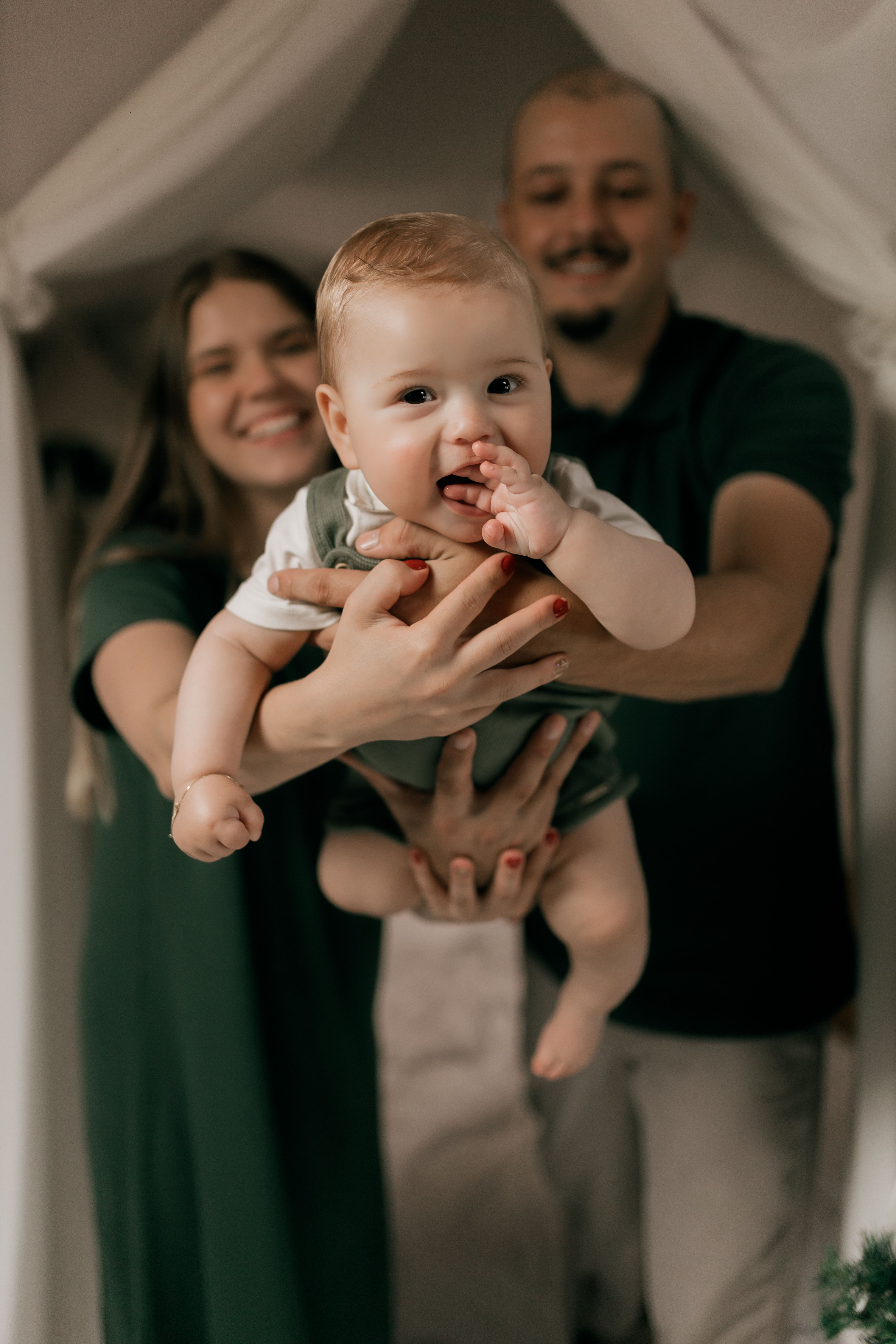 Joyful Family Moment with Baby at Home · Free Stock Photo